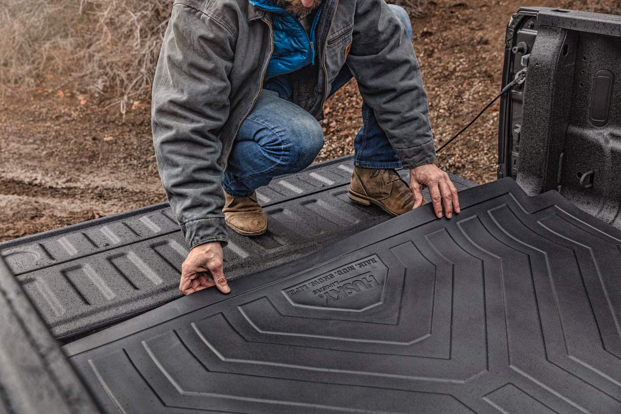 Husky Liners β Heavy Duty Bed Mat | Fits 2017 - 2024 Ford F-250/F-350, (81.9 Bed) Black | 16010