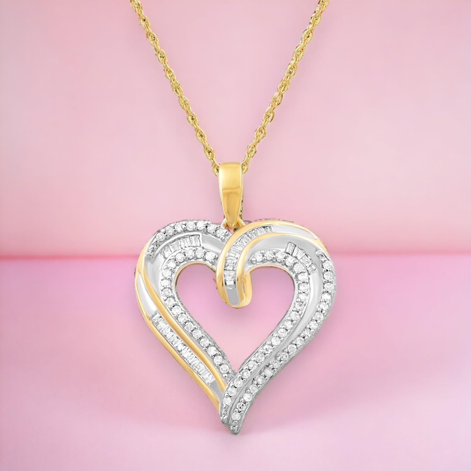 Jewelili 10k Yellow Gold Heart Shape Pendant Necklace with Natural White Round and Baguette Diamonds, 1/4 cttw, 18" Rope Chain