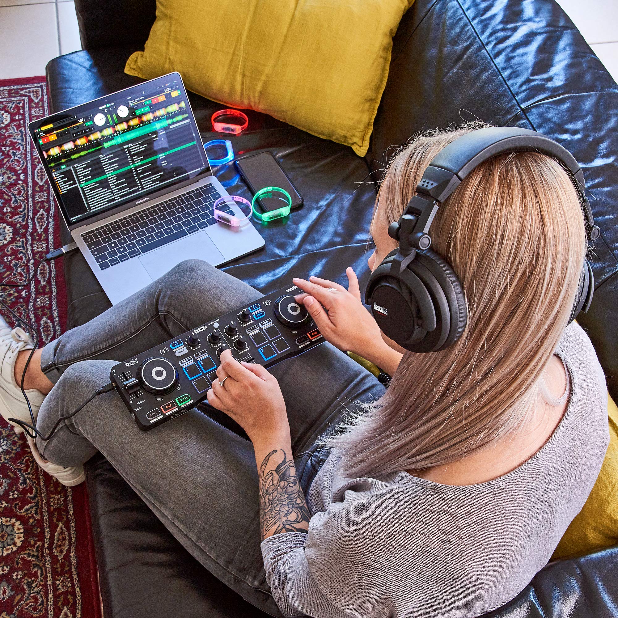 Hercules DJ Party Set: Ultra-compact, 2-deck DJControl Starlight USB DJ controller for Serato DJ Lite, HDP DJ45 headphones, 5 beat-detecting LED wristbands.