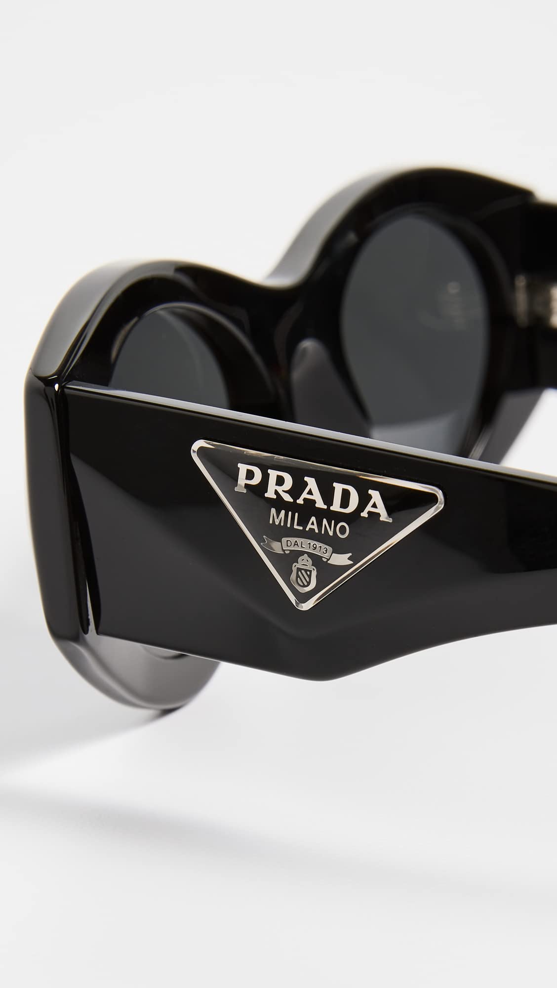 Prada PR 20ZS 1AB5S0 Black Plastic Oval Sunglasses Grey Lens