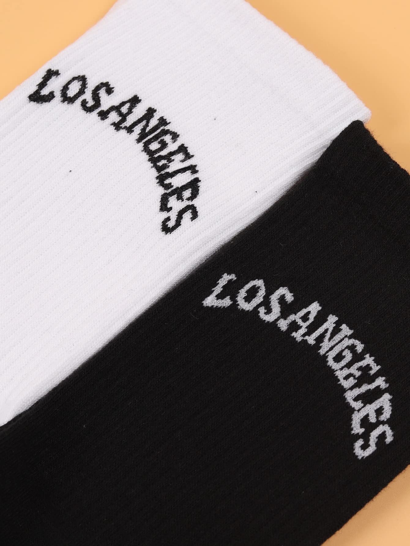 Milumia Women's 2 Pairs Letter Graphic Crew Socks Athletic Running Cushioned Socks Black and White One Size