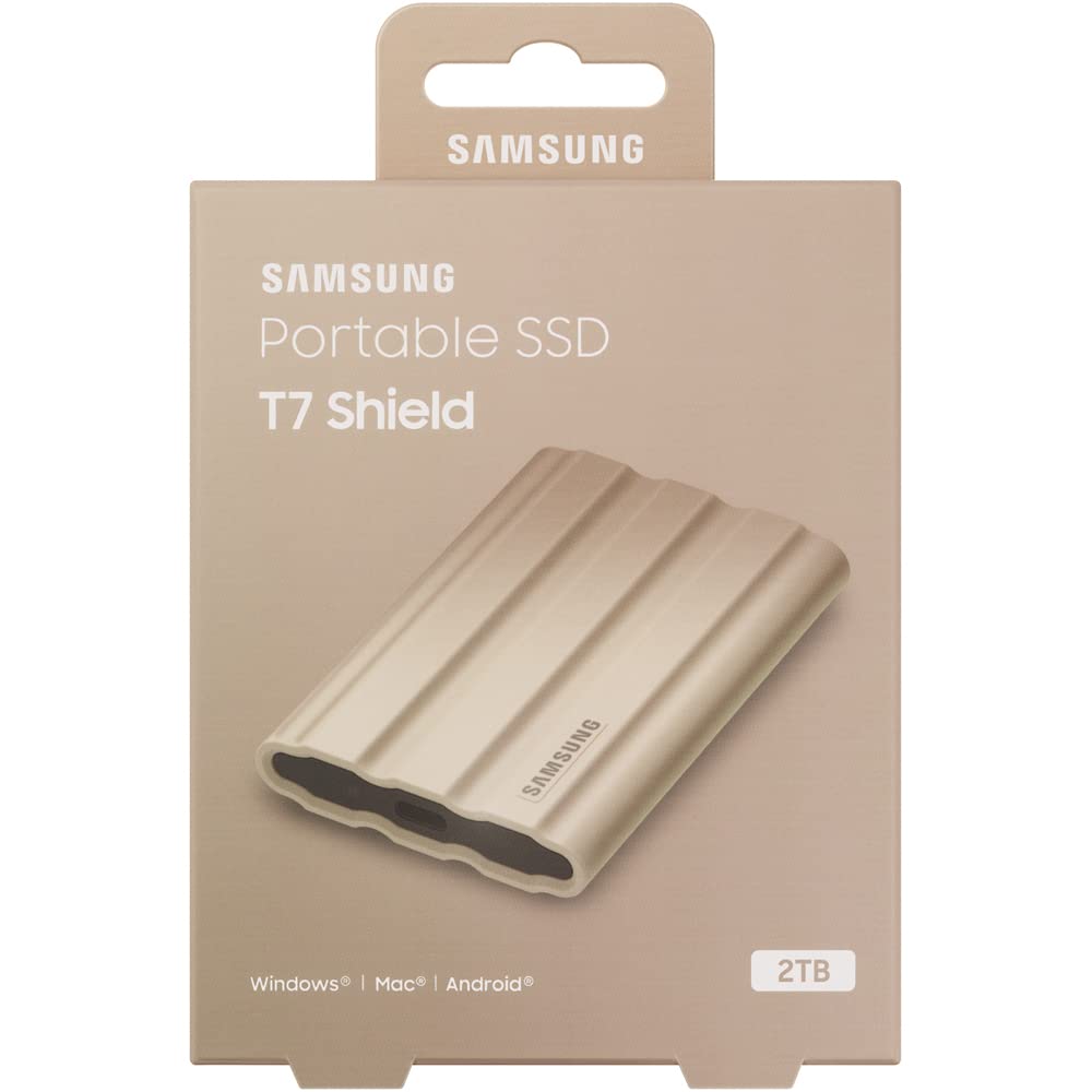 SAMSUNG MU-PE1T0K/AM T7 Shield Portable Solid State Drive 1TB, Beige (2022) Bundle with Lexar 32GB 800x UHS-I SDHC Memory Card and Microfiber Cleaning Cloth