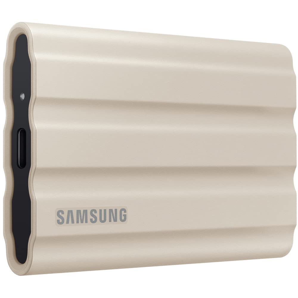 SAMSUNG MU-PE1T0K/AM T7 Shield Portable Solid State Drive 1TB, Beige (2022) Bundle with Lexar 32GB 800x UHS-I SDHC Memory Card and Microfiber Cleaning Cloth