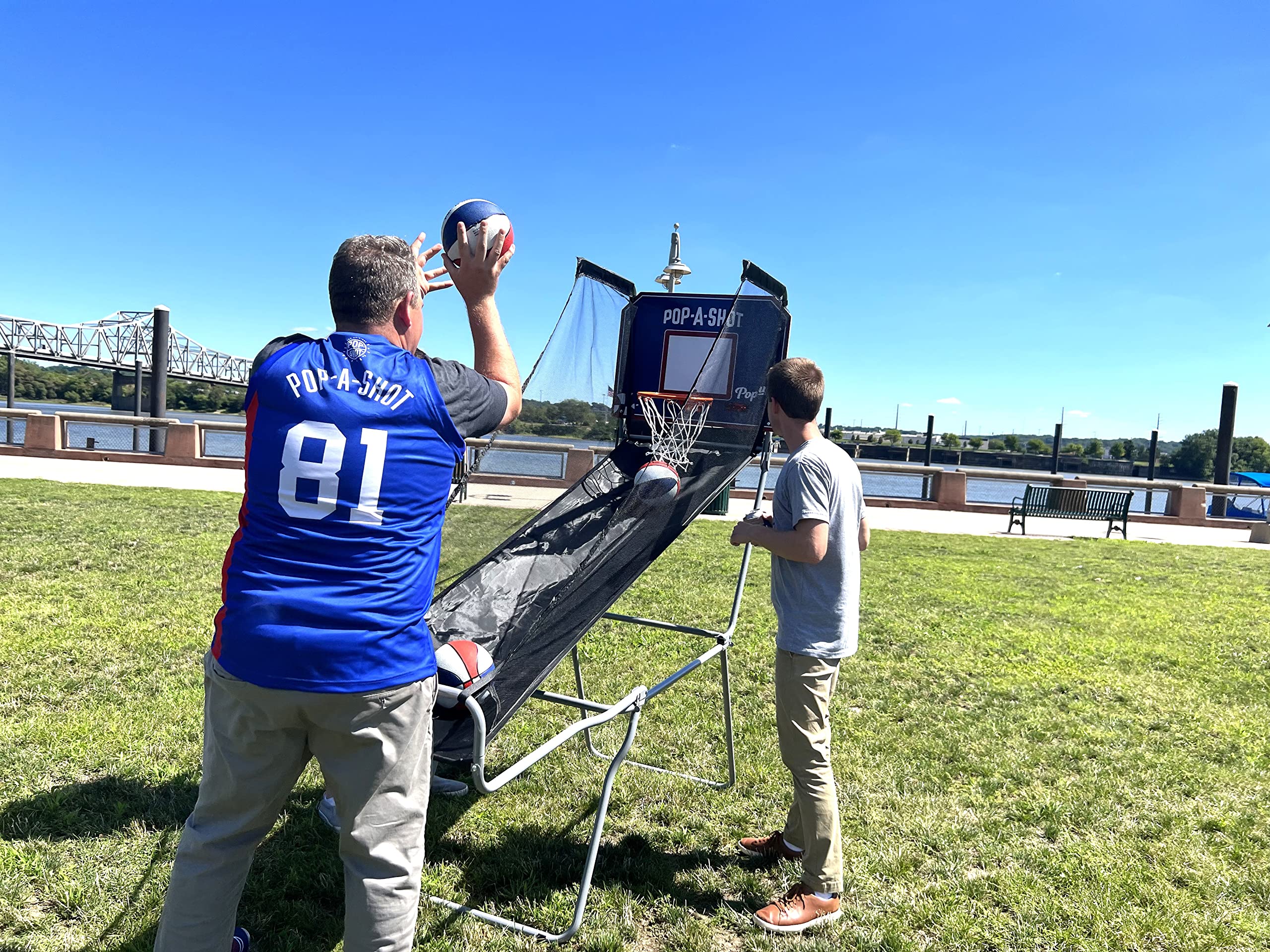 Pop-A-Shot - Pop-Up Game | Arcade Basketball Inside, Out, and On The Go | Infrared Sensor Scoring | 3 Balls | Foldable, Portable, and Tote Bag Included