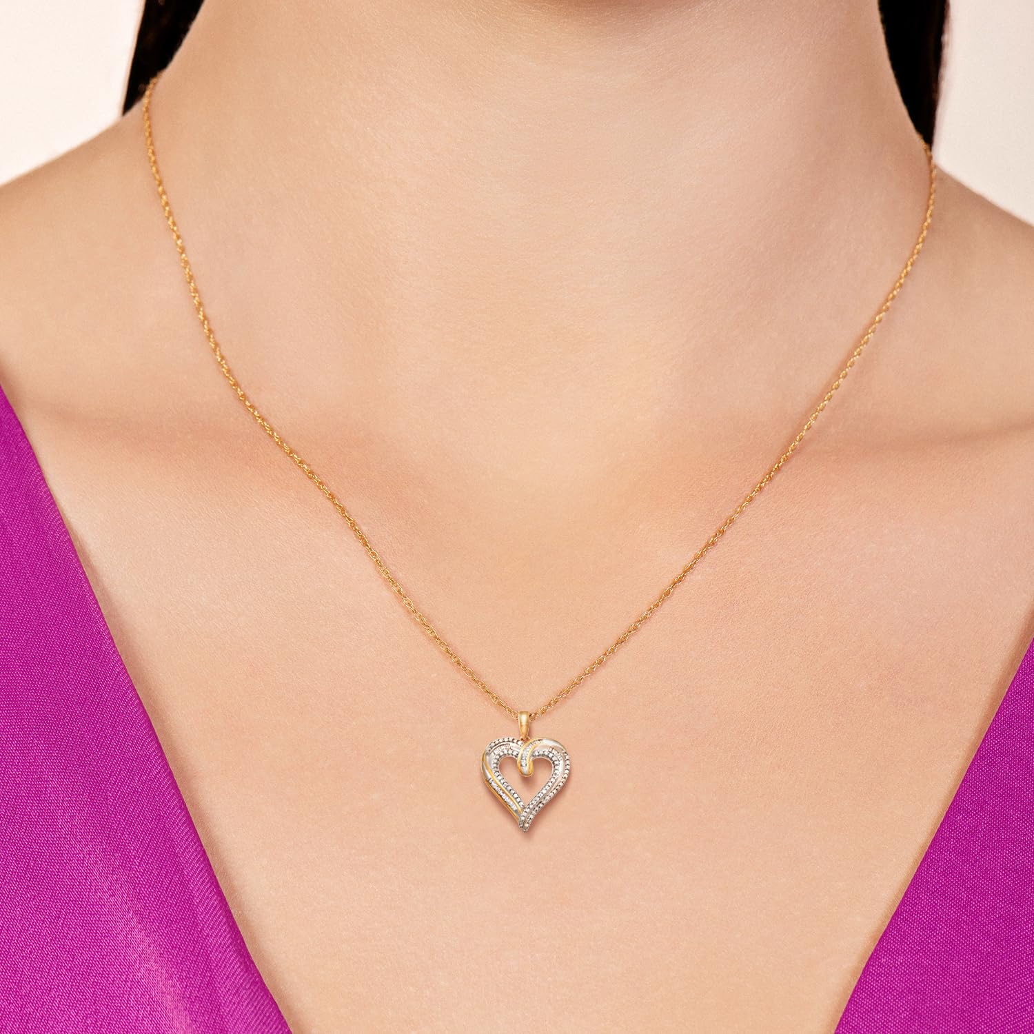 Jewelili 10k Yellow Gold Heart Shape Pendant Necklace with Natural White Round and Baguette Diamonds, 1/4 cttw, 18" Rope Chain
