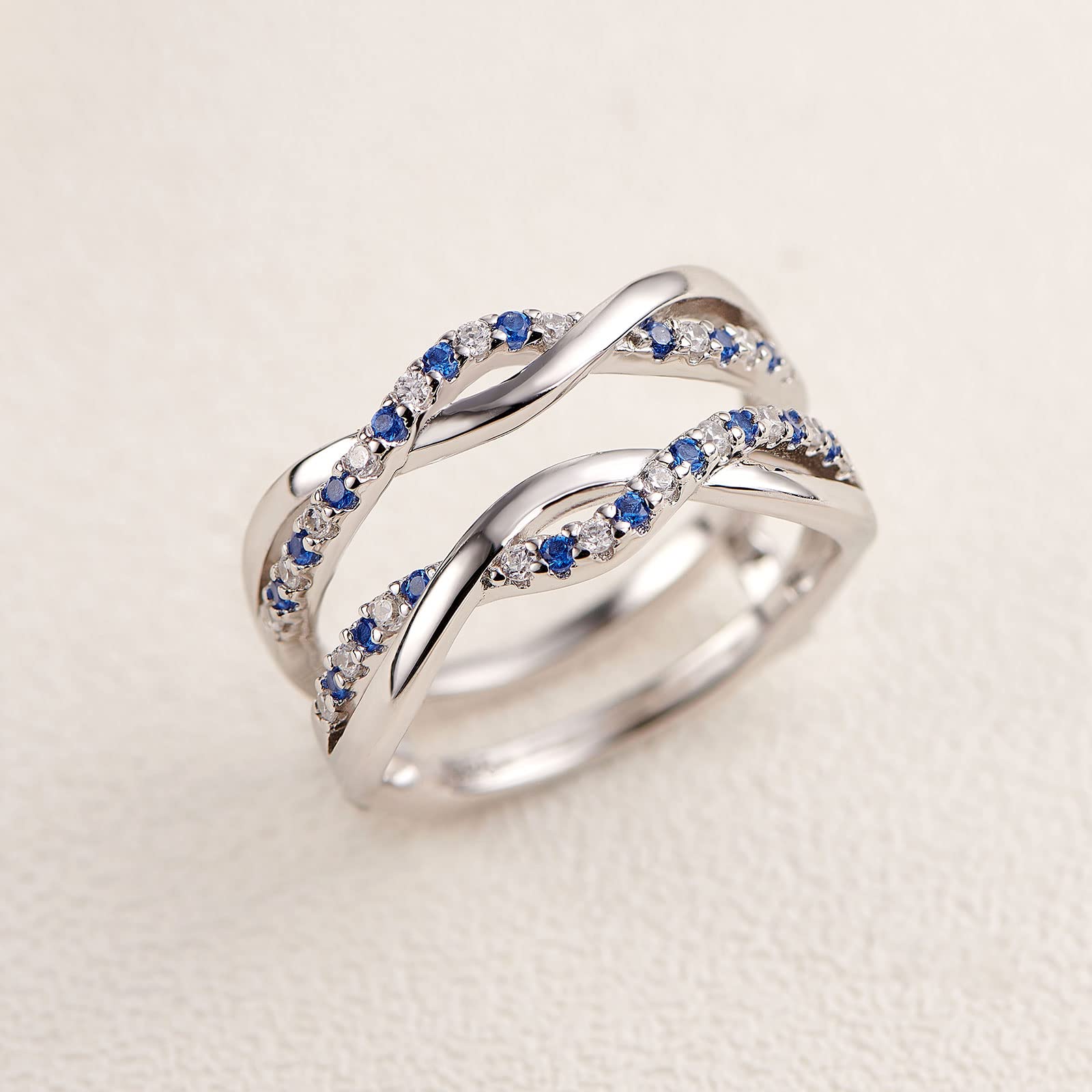 Newshe Jewellery Ring Enhancer for Engagement Rings AAAAA Cz Twisting Infinity 925 Sterling Silver Band with Blue Sapphire Size 7