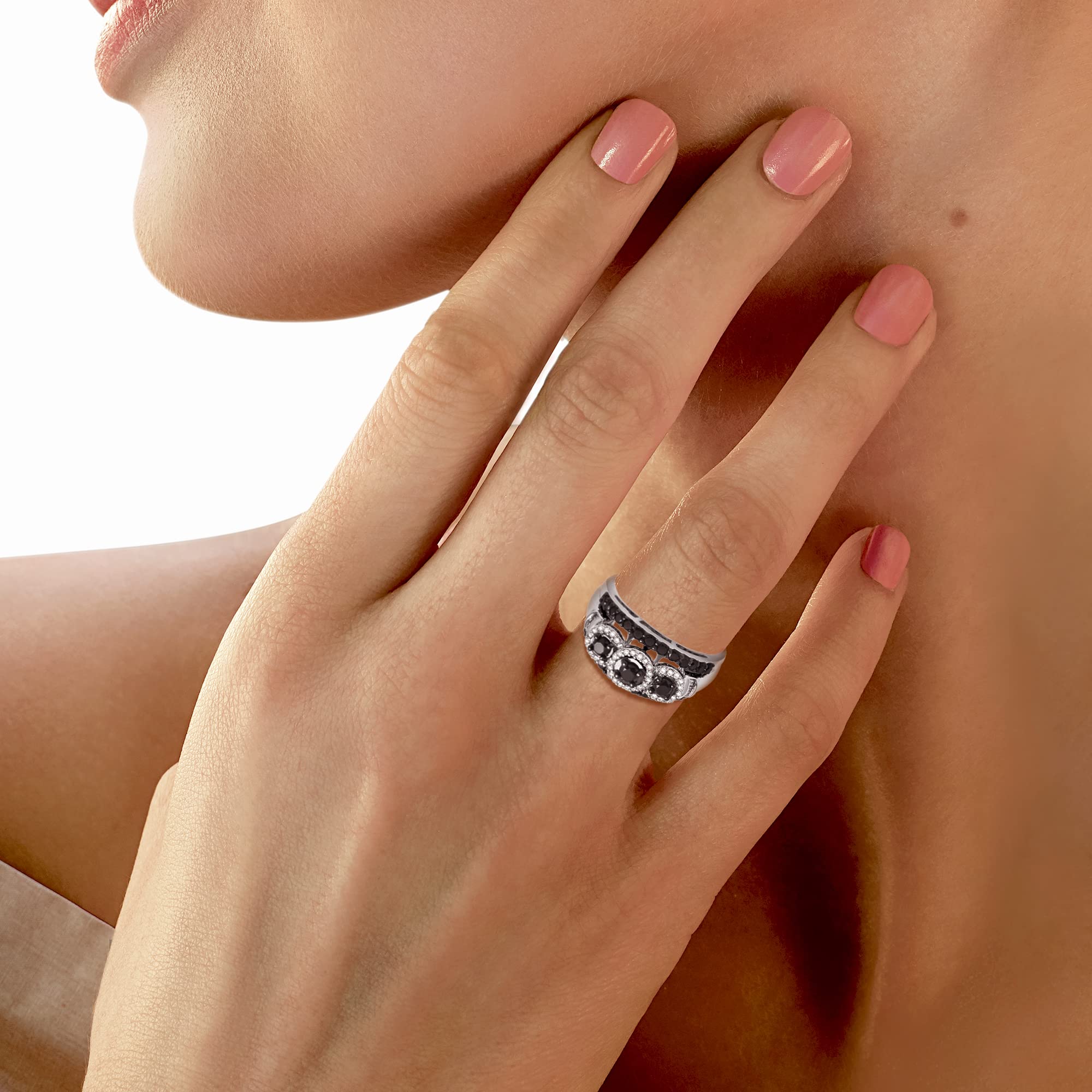 Jewelili 10K White Gold 1.0 Cttw Treated Black Round and Natural White Round and Baguette Diamonds Three-Stone Ring, Size 7