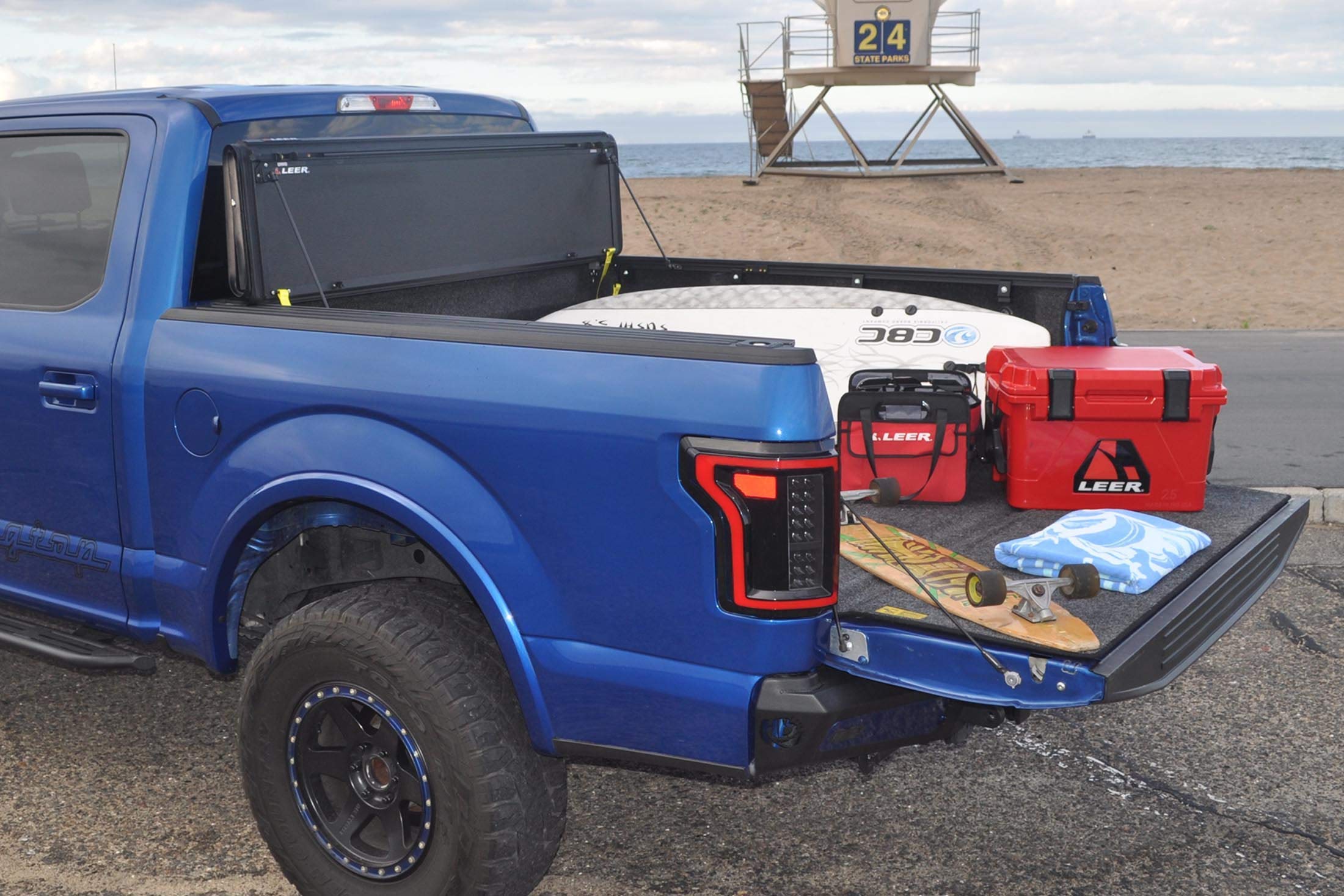 LEER HF650M Quad-Folding Truck Bed Tonneau Cover, Fits Ford F-150 Light Duty, Years 2015-2024, 5'6" Truck Bed, Black
