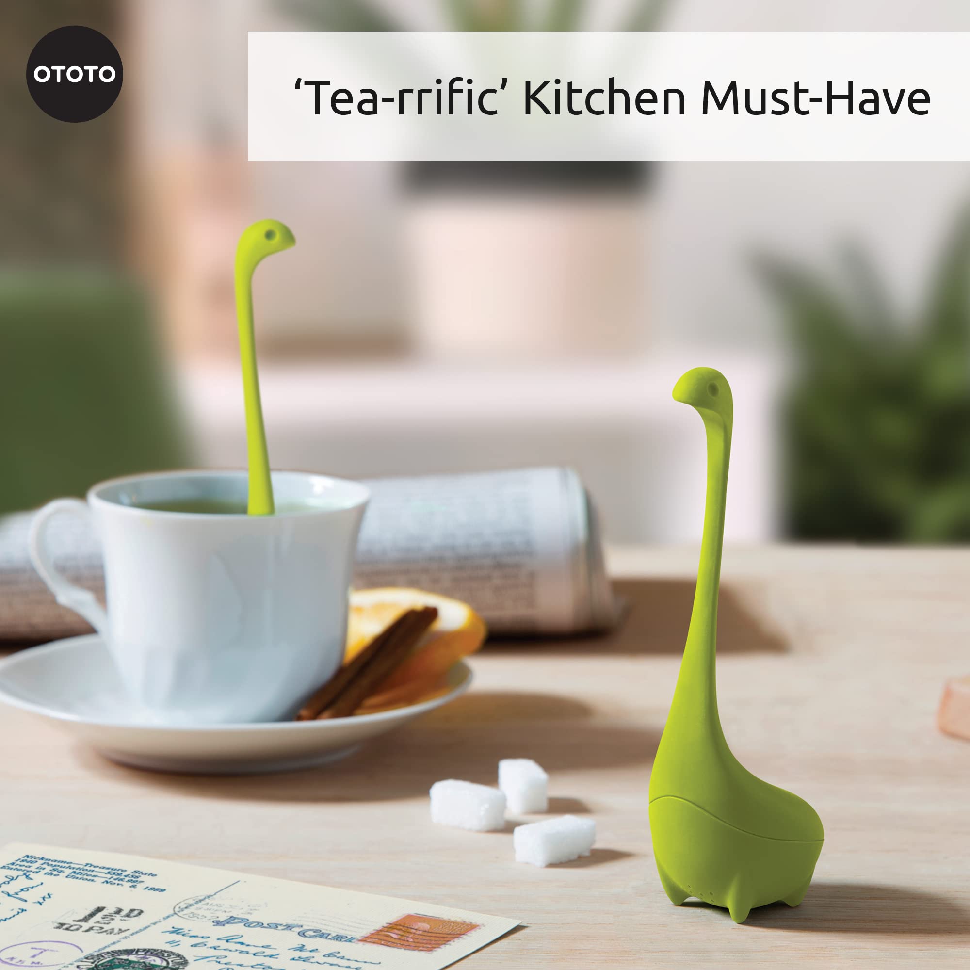 OTOTO Baby Nessie Loose Leaf Tea Infuser (Purple) - Dinosaur Tea Infuser Strainer with Steeping Spoon - Long Handle Neck, Cute Ball Body Lake Monster Silicone Tea Infuser for Loose Leaf Herbal Tea
