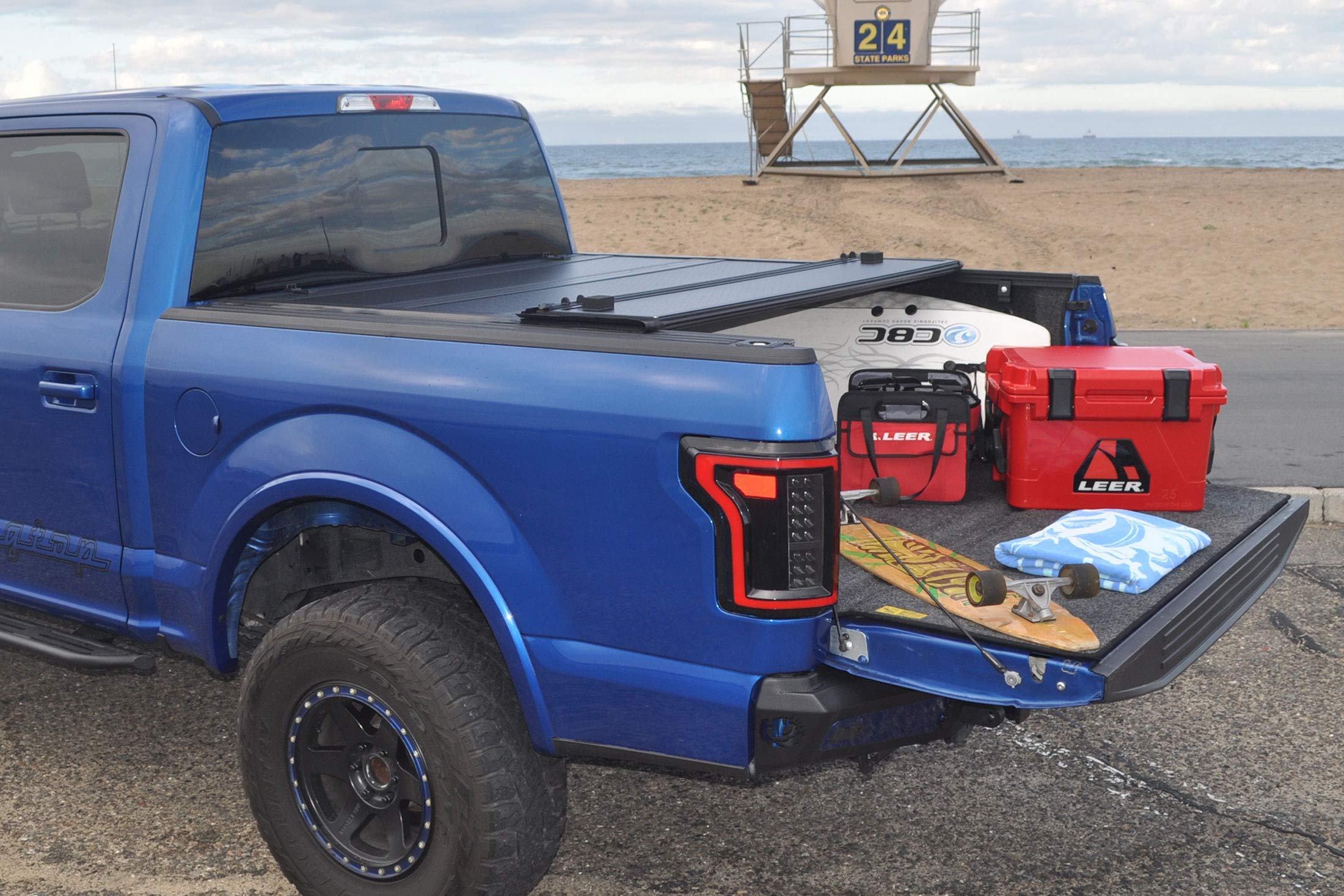 LEER HF650M Quad-Folding Truck Bed Tonneau Cover, Fits Ford F-150 Light Duty, Years 2015-2024, 5'6" Truck Bed, Black