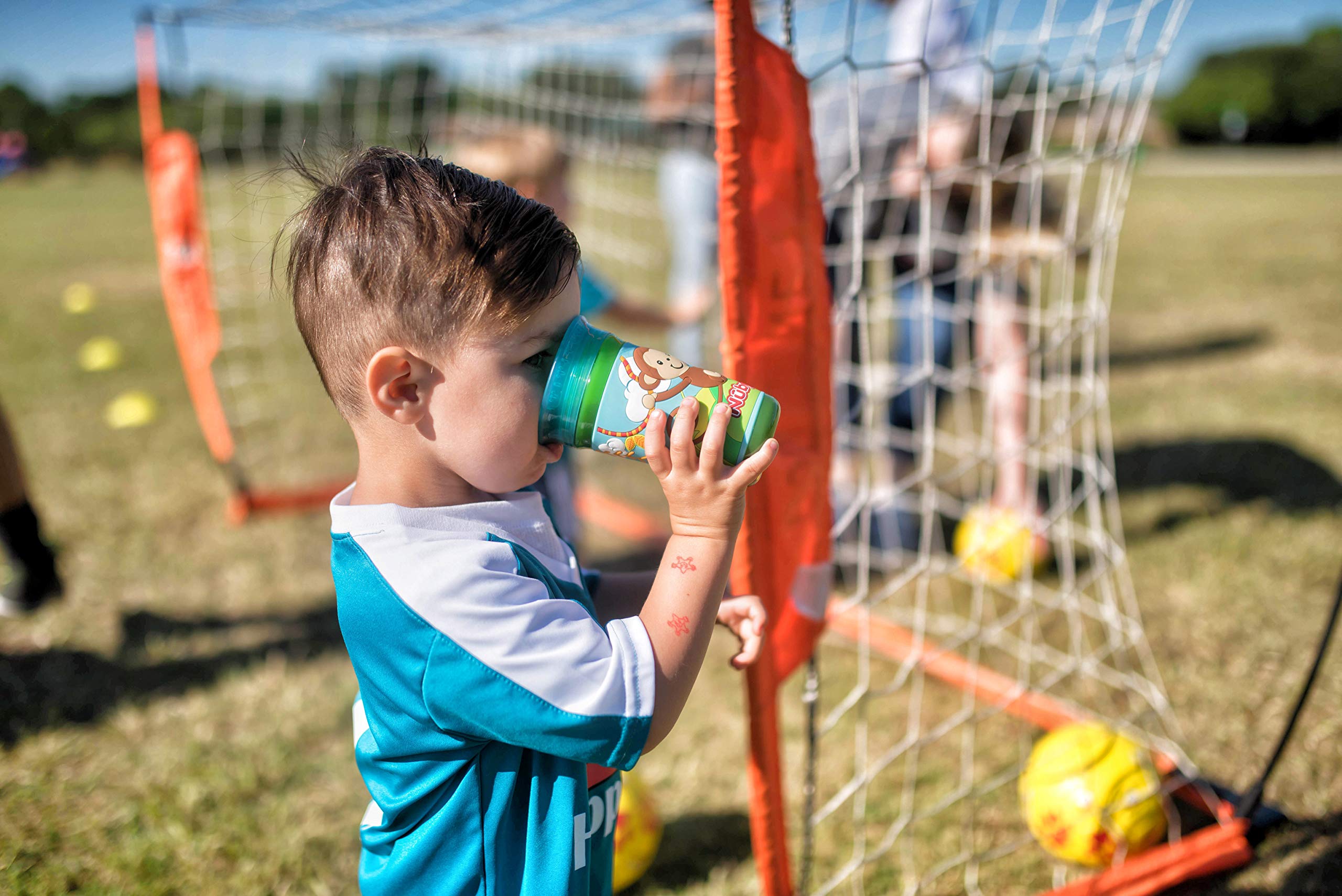 Nuby 360 Degree Easy Sip 3D Grip Wonder Cup with Printed Silicone Sleeve, 10 Oz, Monkey