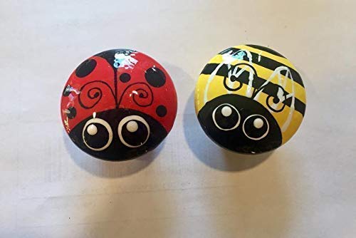 Unique and adorable hand painted red ladybug drawer cabinet pulls and knobs. 1 ½ inches round.