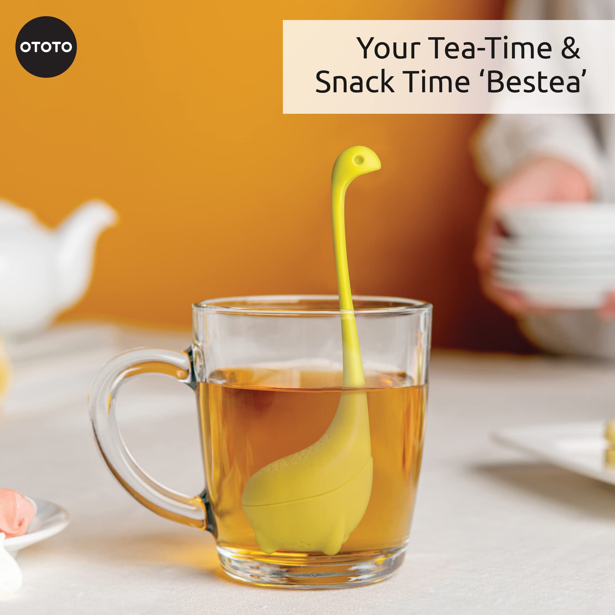 OTOTO Baby Nessie Loose Leaf Tea Infuser (Purple) - Dinosaur Tea Infuser Strainer with Steeping Spoon - Long Handle Neck, Cute Ball Body Lake Monster Silicone Tea Infuser for Loose Leaf Herbal Tea