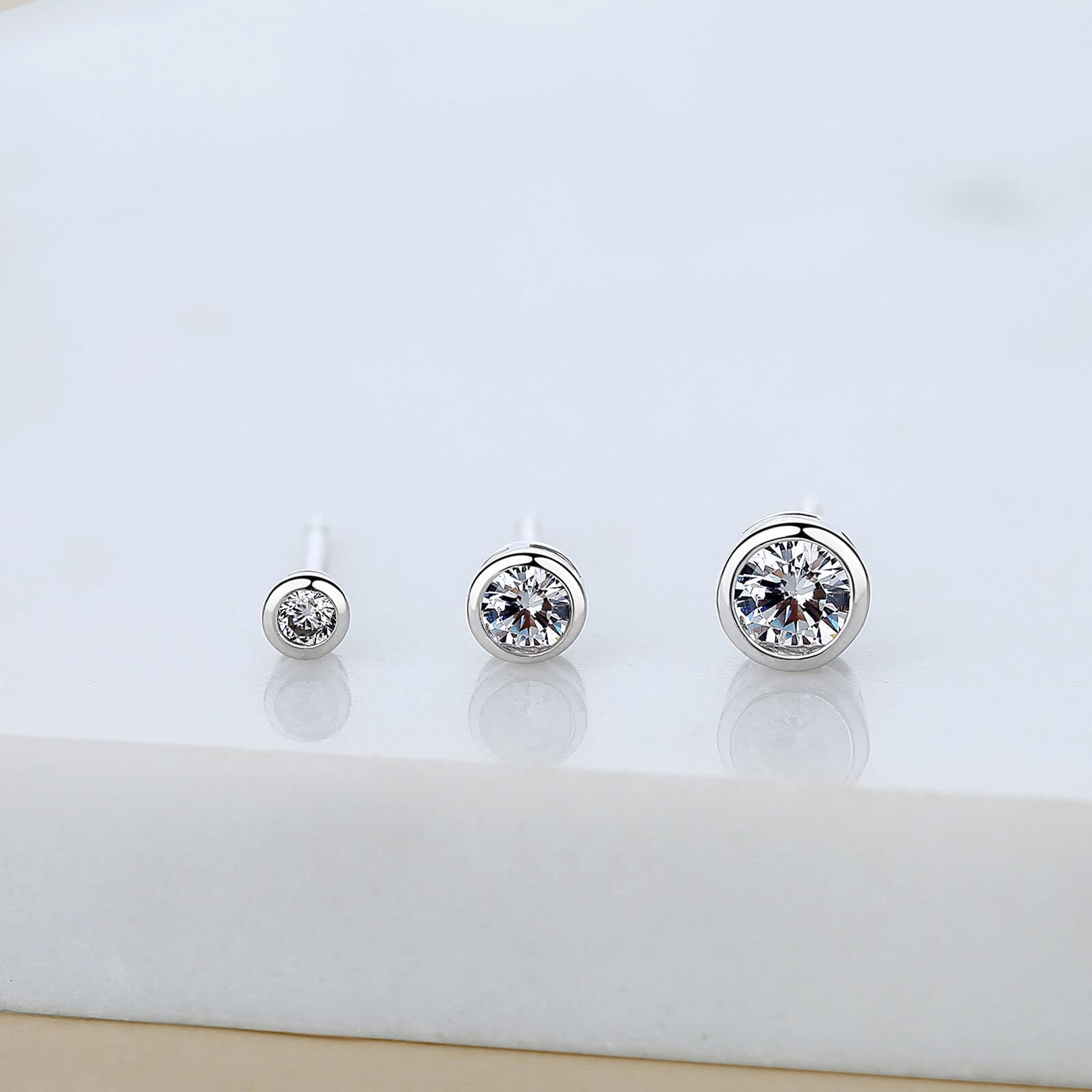 Lavishe Rhodium Plated 925 Sterling Silver Cubic Zirconia Round Bezel Set Stud Earrings, 4mm Stone