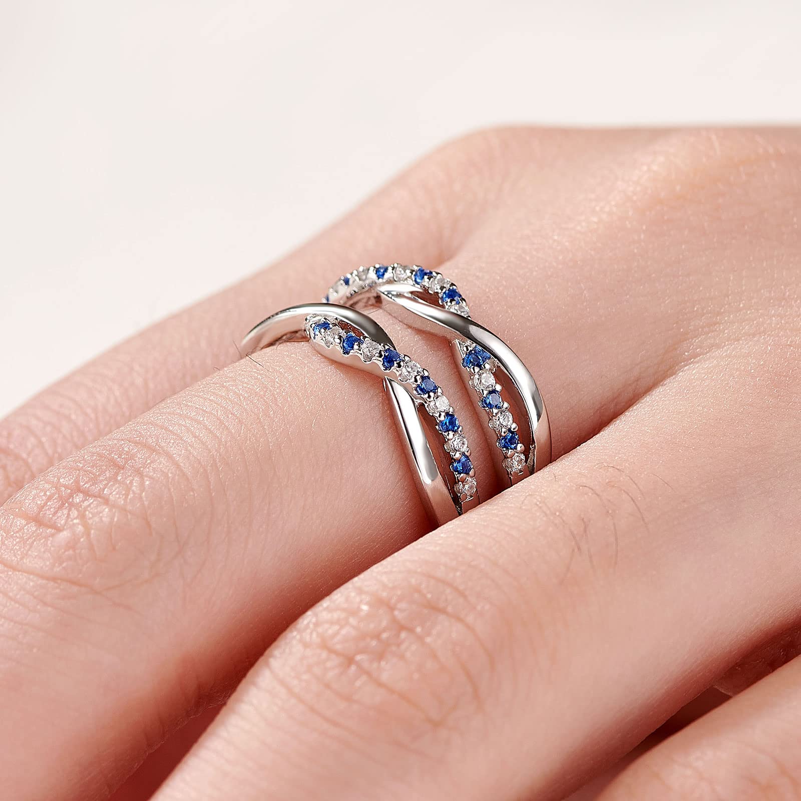 Newshe Jewellery Ring Enhancer for Engagement Rings AAAAA Cz Twisting Infinity 925 Sterling Silver Band with Blue Sapphire Size 7