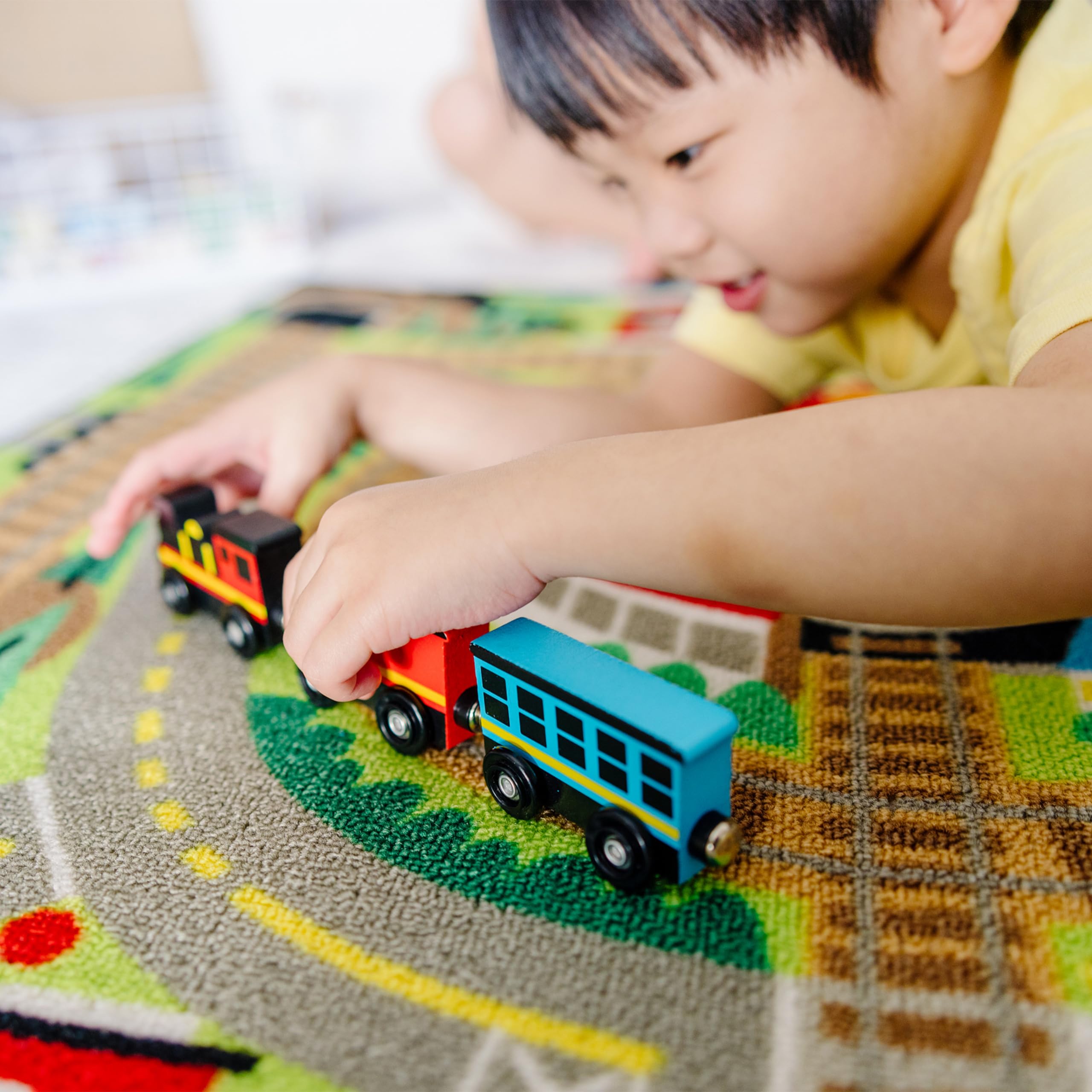 Melissa & Doug Round the Rails Train Activity Play Rug, 3 Wooden Train Cars (39" x 36")