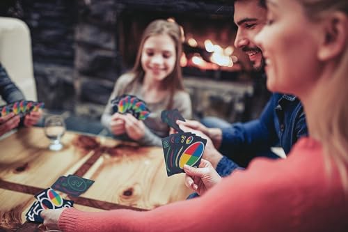 Mattel Games UNO Premium 50th Anniversary Edition Matching Card Game Featuring Commemorative Coin & 112 Cards, Game Night, Kids & Collectors Gift Ages 7 Years & Older.