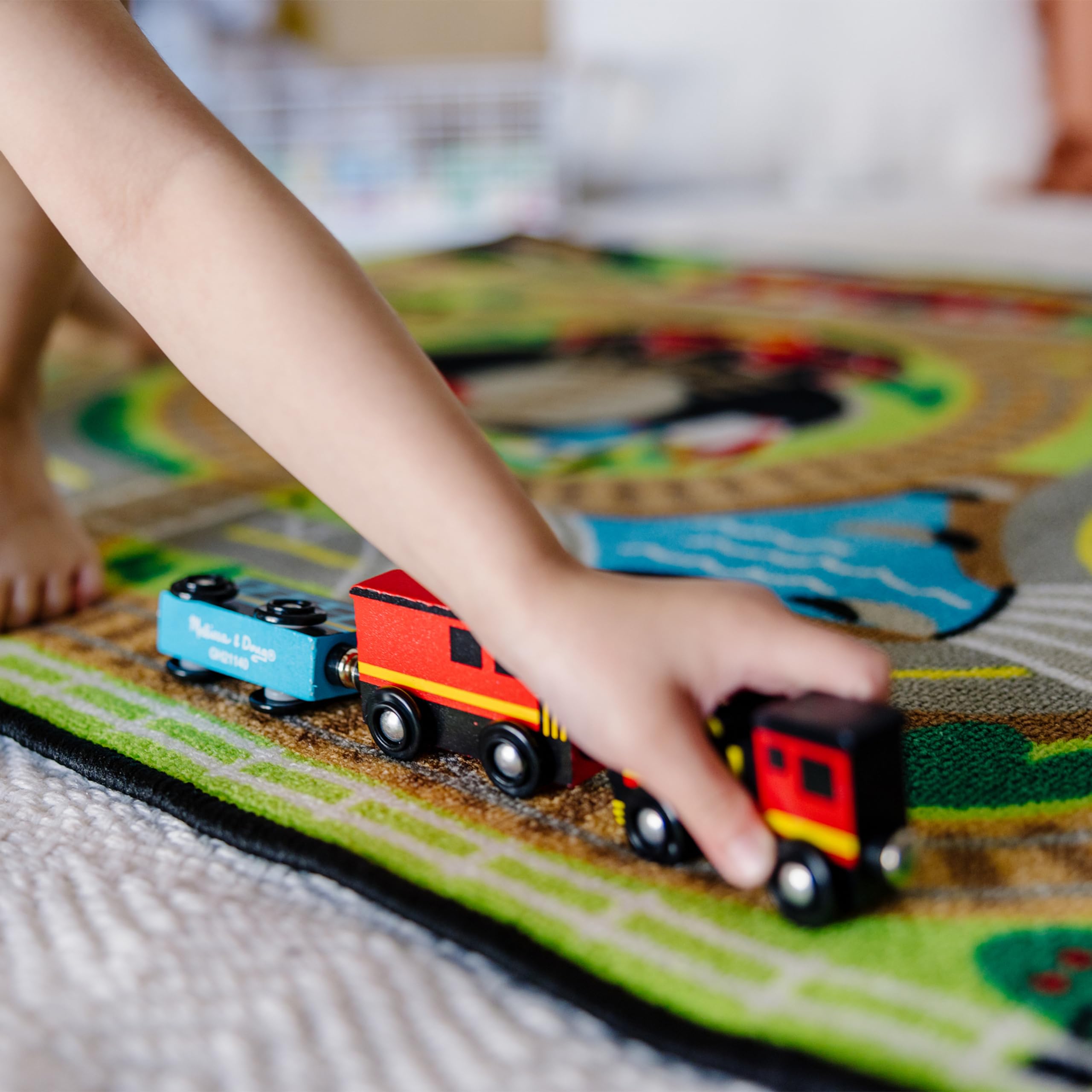 Melissa & Doug Round the Rails Train Activity Play Rug, 3 Wooden Train Cars (39" x 36")