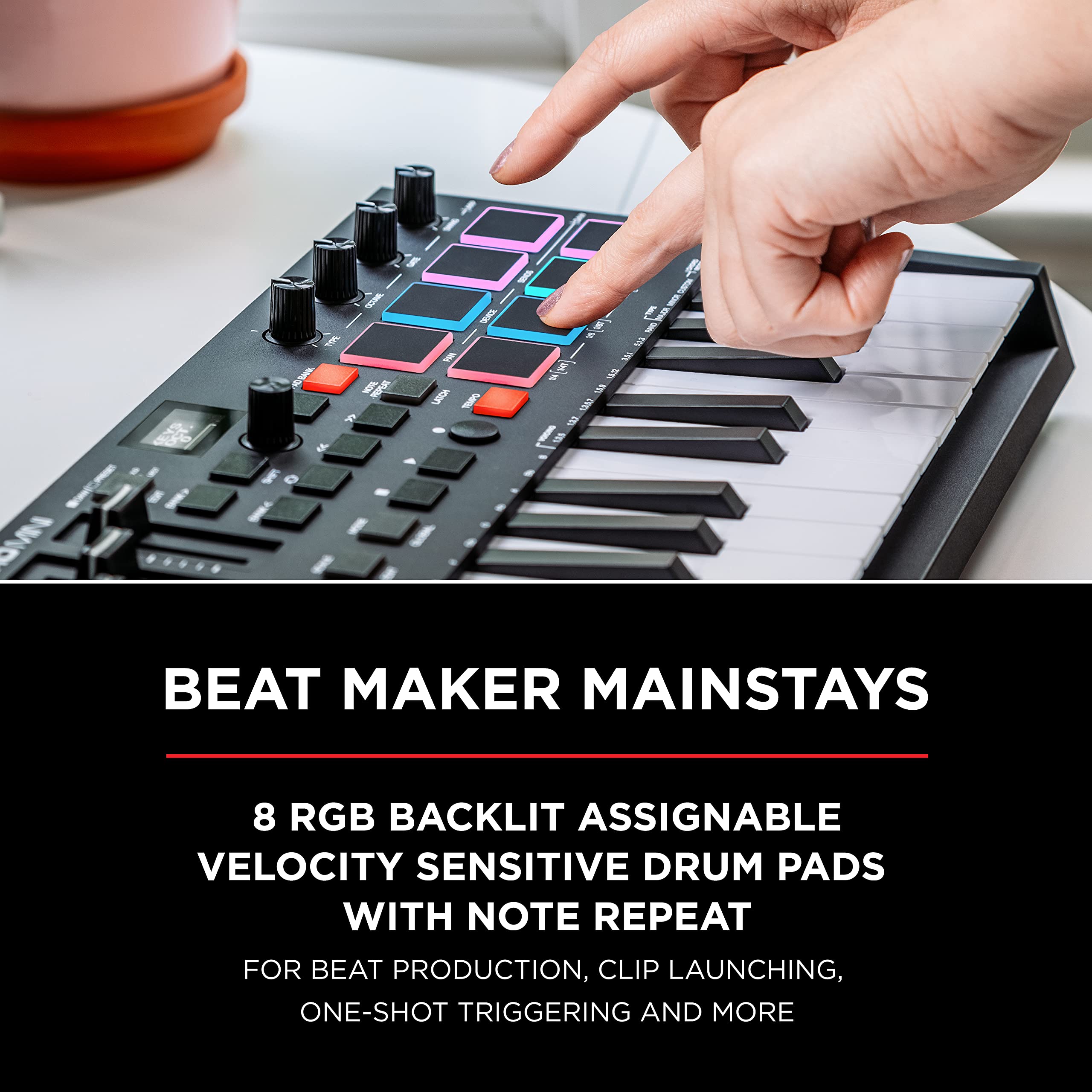 M-Audio Oxygen Pro Mini β 32 Key USB MIDI Keyboard Controller With Beat Pads, MIDI assignable Knobs, Buttons & Faders and Software Suite Included