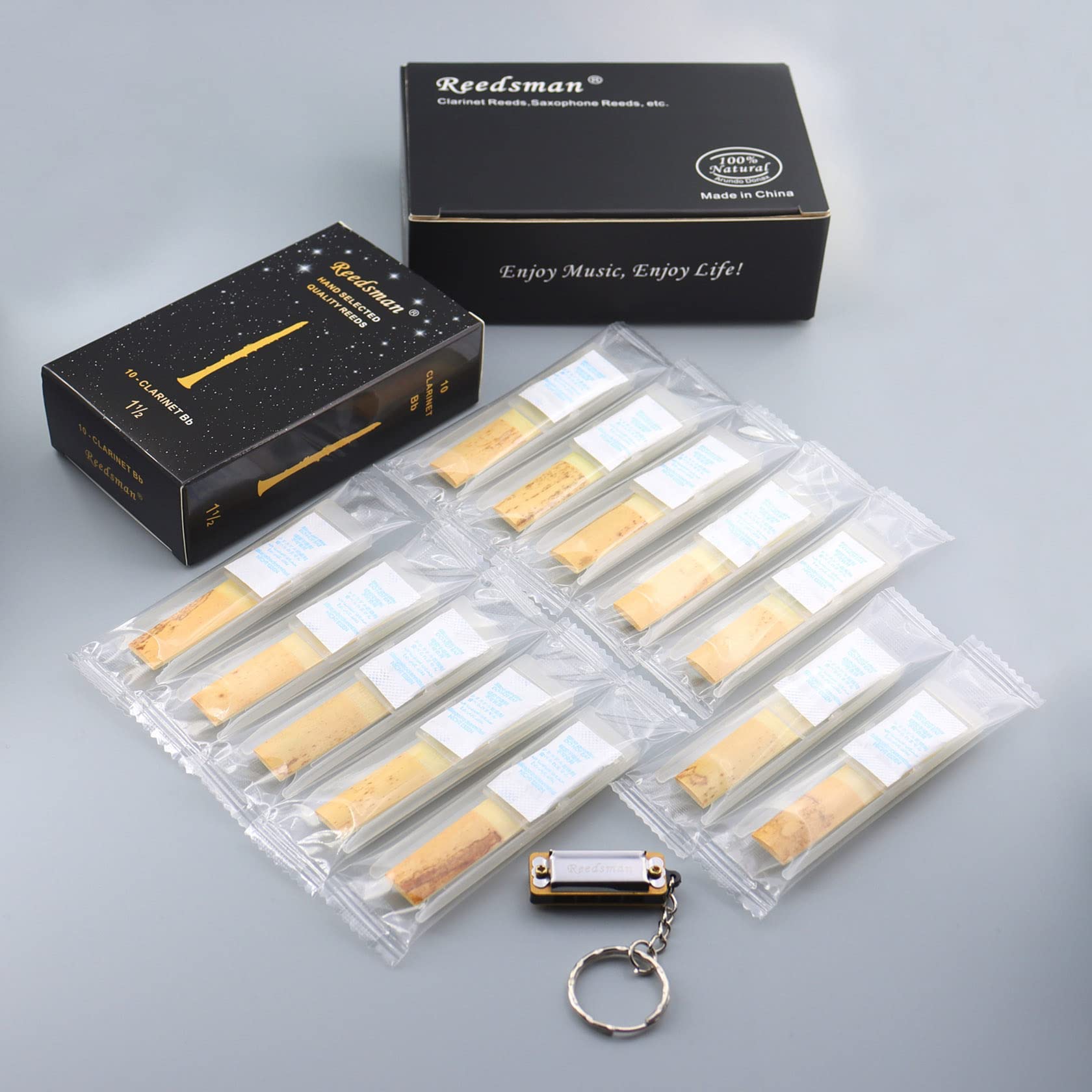 Reedsman Traditional Bb Clarinet Reeds, Includes 10 Plus 2 Total 12 Pack Reeds With Individual Reed Holders and One Mini Harmonica. (Strength 1.5)