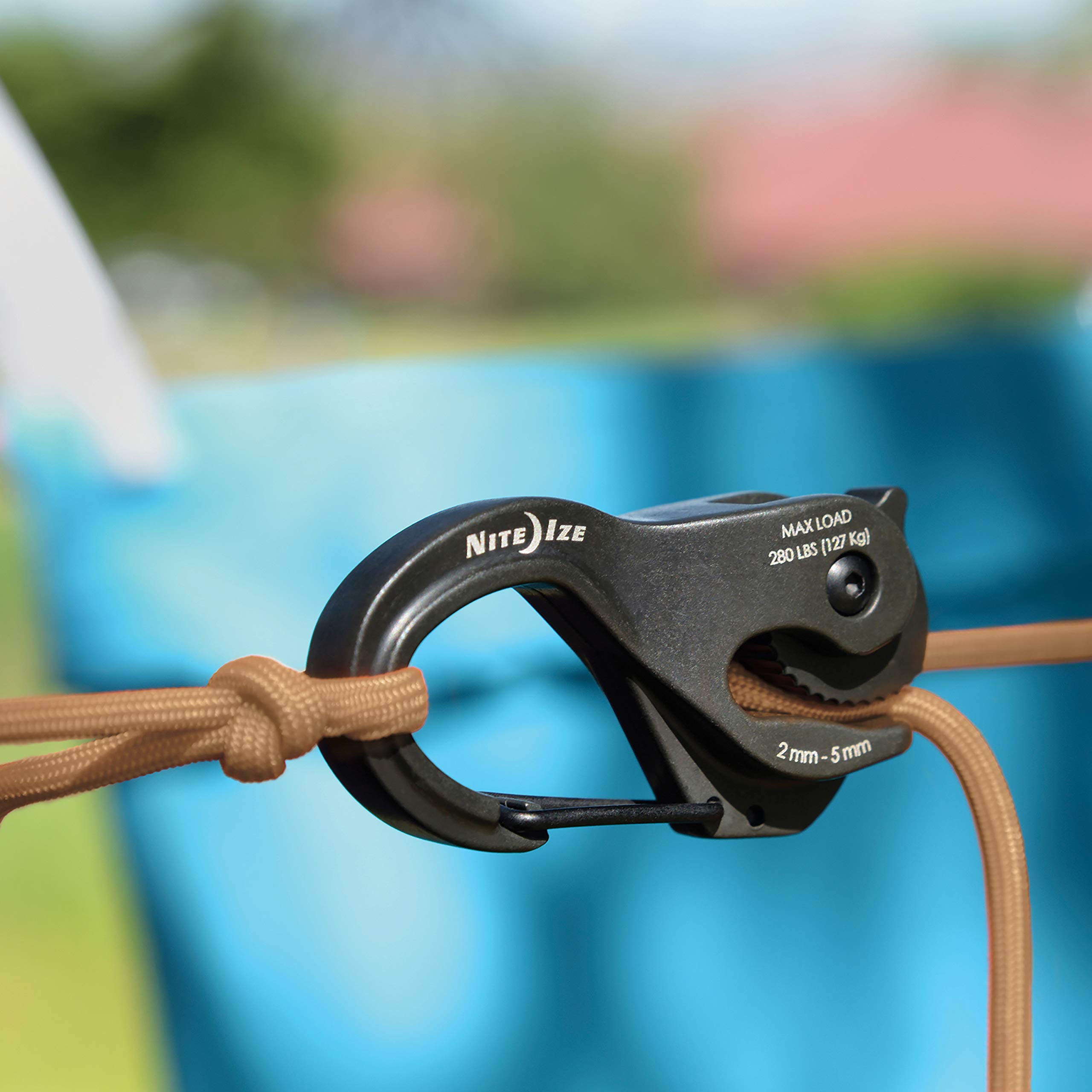 Nite Ize CamJam XT Aluminum Rope Tightener - Versatile Tie Down Cam Mechanism with Carabiner Clip - Secure Hiking Gear Essential - Rope Tie Down Accessory - Black/Coyote