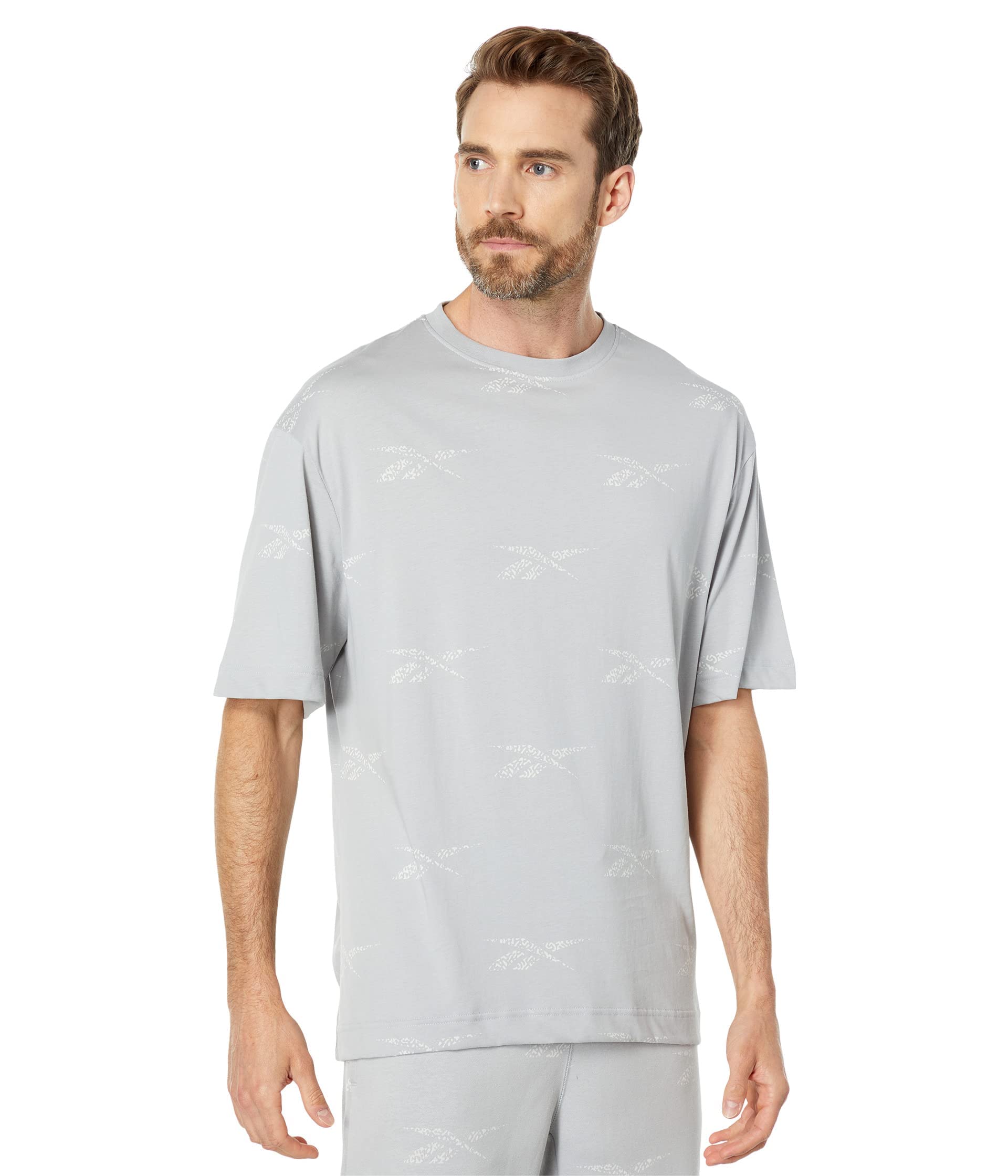 Reebok Men's Standard Graphic Tee, Pure Grey/White Logo Repeat Print, Medium