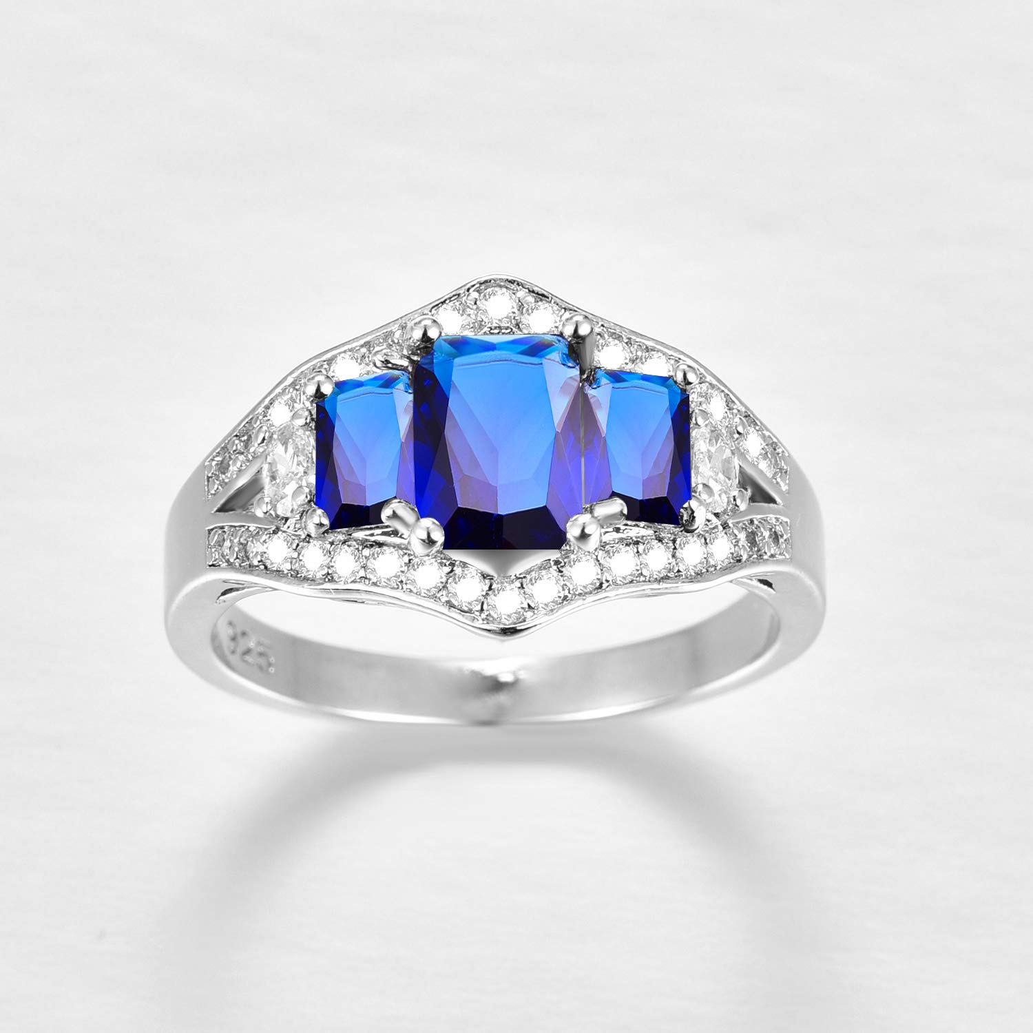 Narica Silver Plated 3-Stone Emerald Cut Created Blue Sapphire Cubic Zirconia Filled Halo Wedding Engagement Band Elegant Women's Ring for Mom Bridal Lover 7#