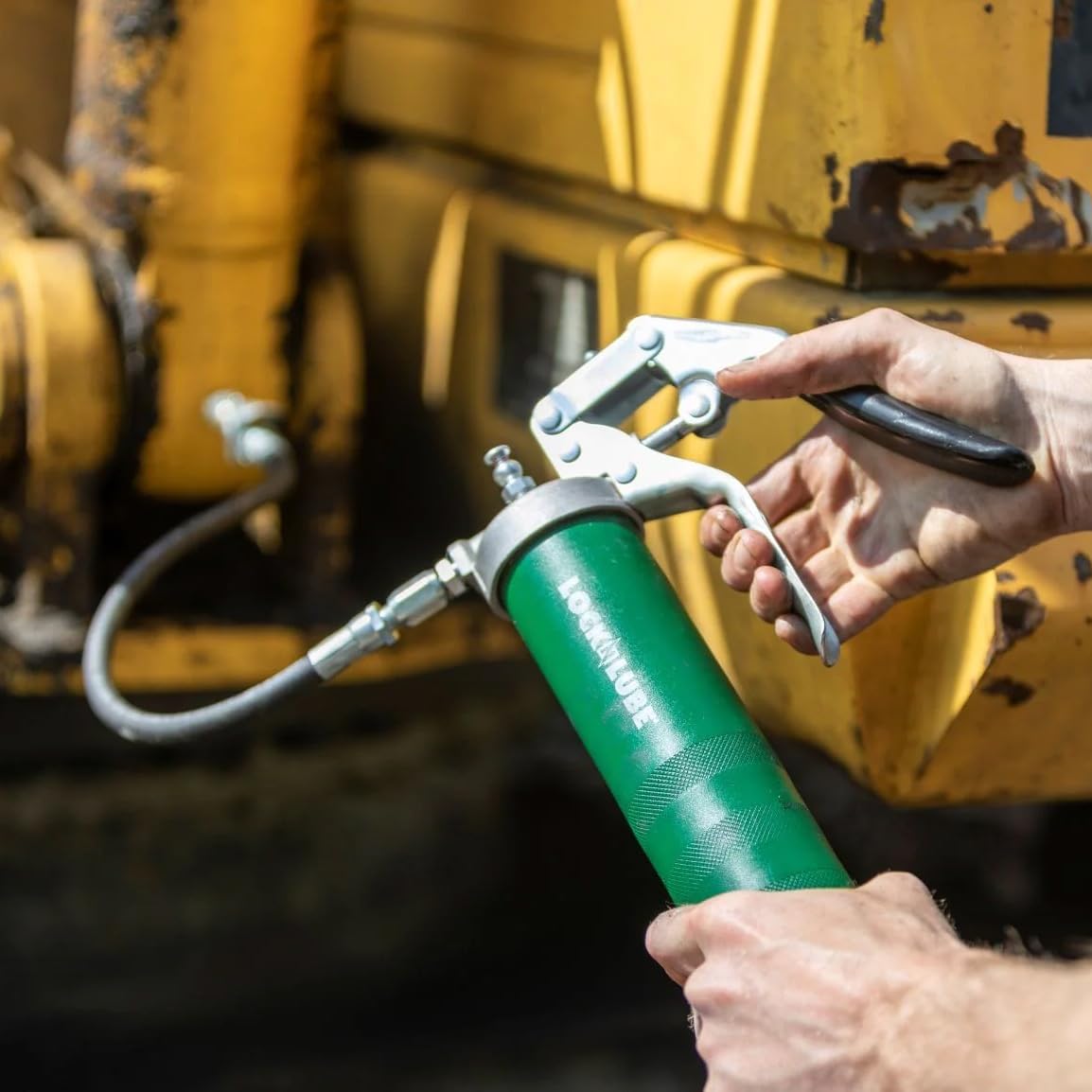 LockNLube Heavy-Duty Pistol Grip Grease Gun. Includes our patented LockNLubeĀ® Grease Coupler (Locks On, Stays On, Won't Leak!) plus a high-quality 20" hose and in-line hose swivel