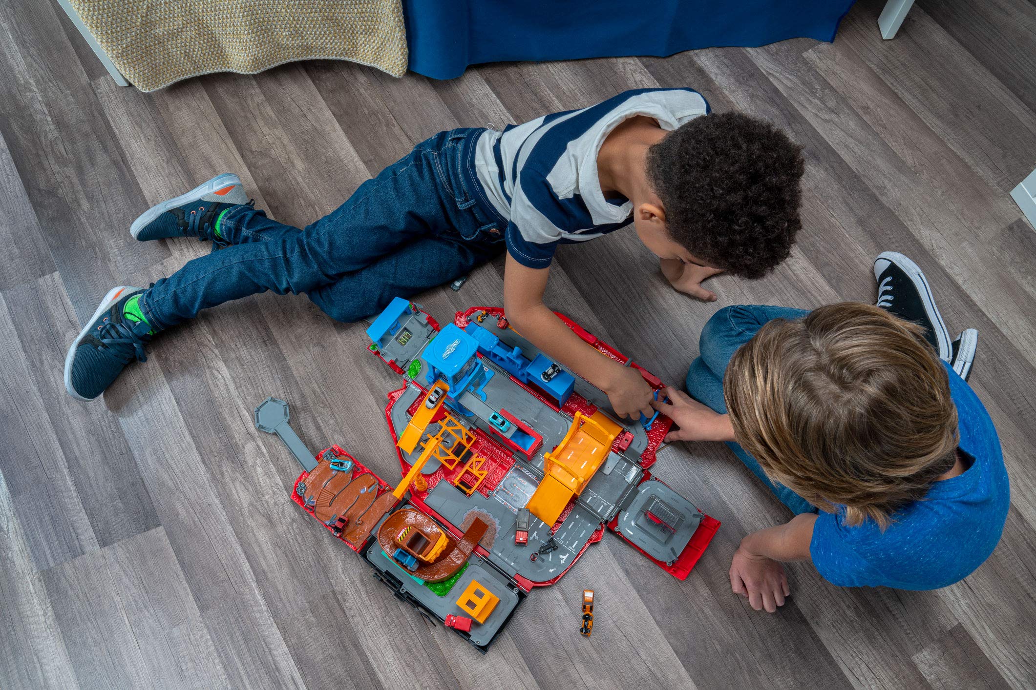 Micro Machines Super Van City Playset - Includes 12 MM Vehicles, Working Bridge, Construction Site, High Rise Building, Drag Strip, Ramps - Collect Them All