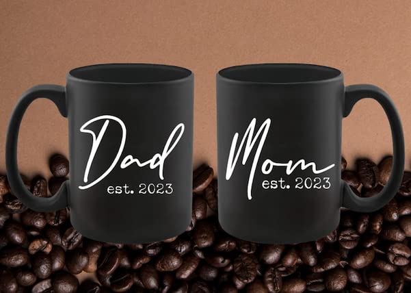 Pregnancy Gift Est 2023 - New Mommy and Daddy Est 2023 11 oz Black Mug Set with "And So The Adventure Begin" Romper (0-3 Months) - Top Mom and Dad Gift Set for New and Expecting Parents to Be