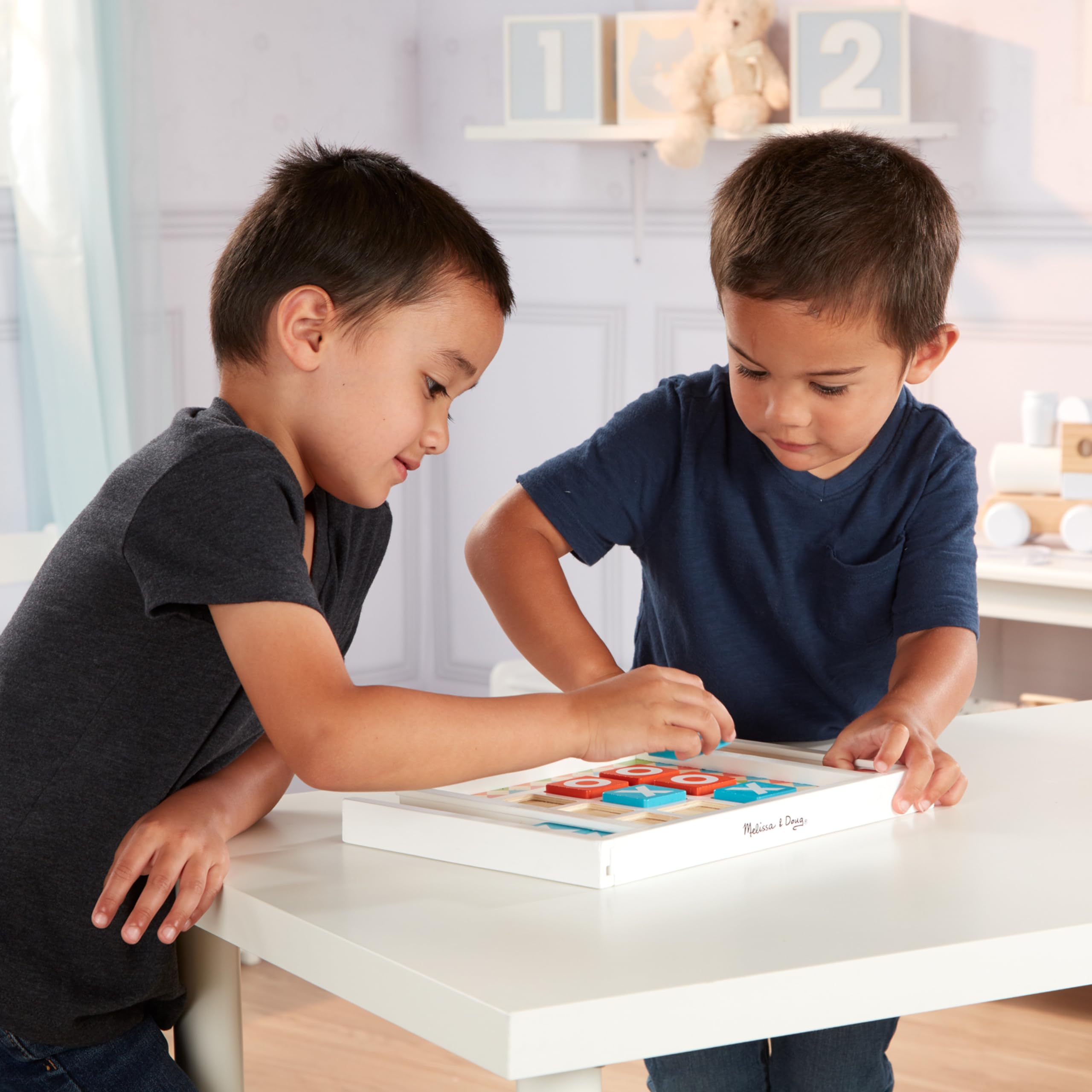 Melissa & Doug Wooden Tic-Tac-Toe Board Game with 10 Self-Storing Wooden Game Pieces (12.5†W x 8.5†L x 1.25†D)