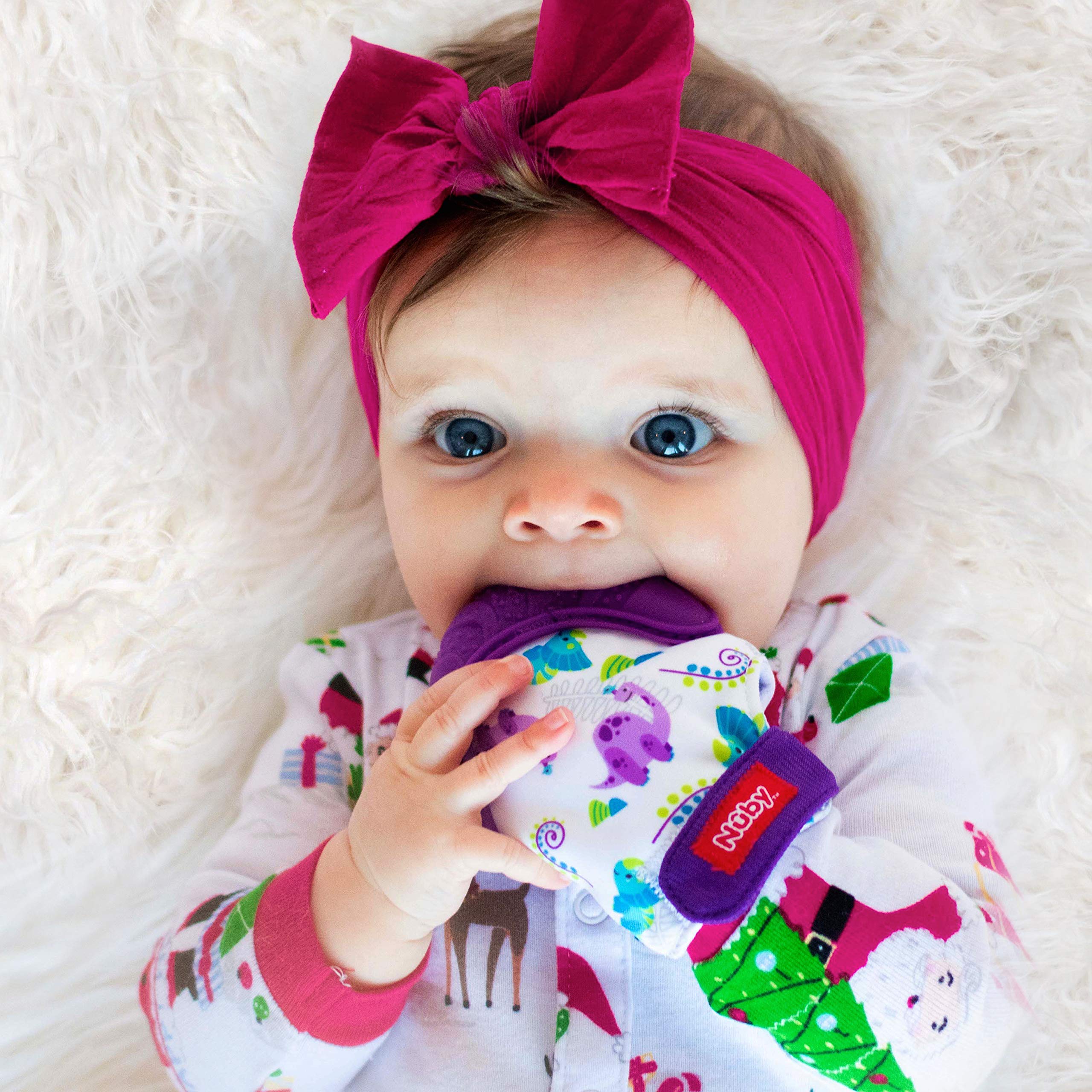 Nuby Soothing Teething Mitten with Hygienic Travel Bag, Dinosaurs, Purple