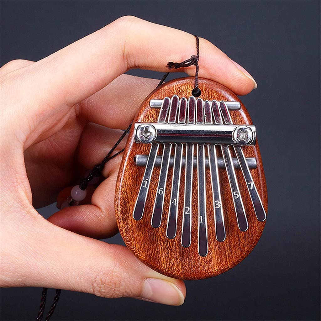 WSJIE 8 Key Mini Exquisite Finger Thumb Piano Musical Good Accessory Pendant Gift