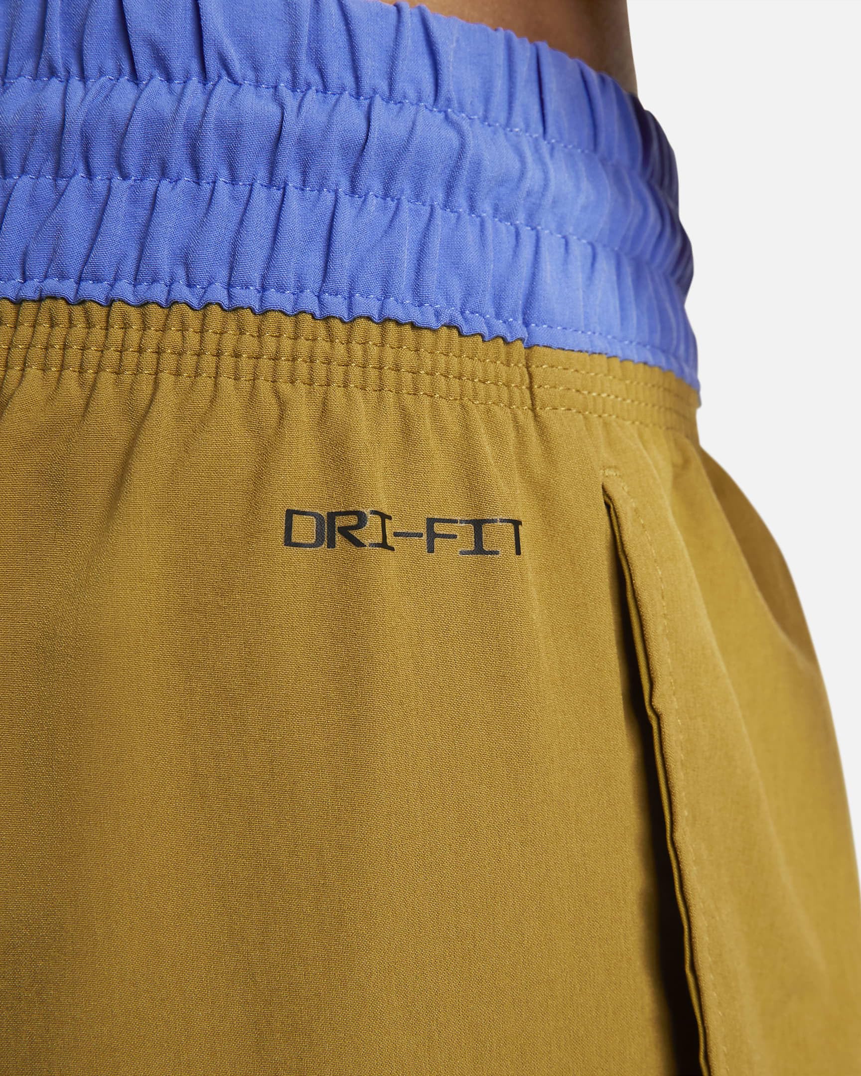 Nike Sportswear NSW Women's Woven Sports Utility Mid-Rise Cargo Pants, Golden Moss/Medium Blue, S Regular US