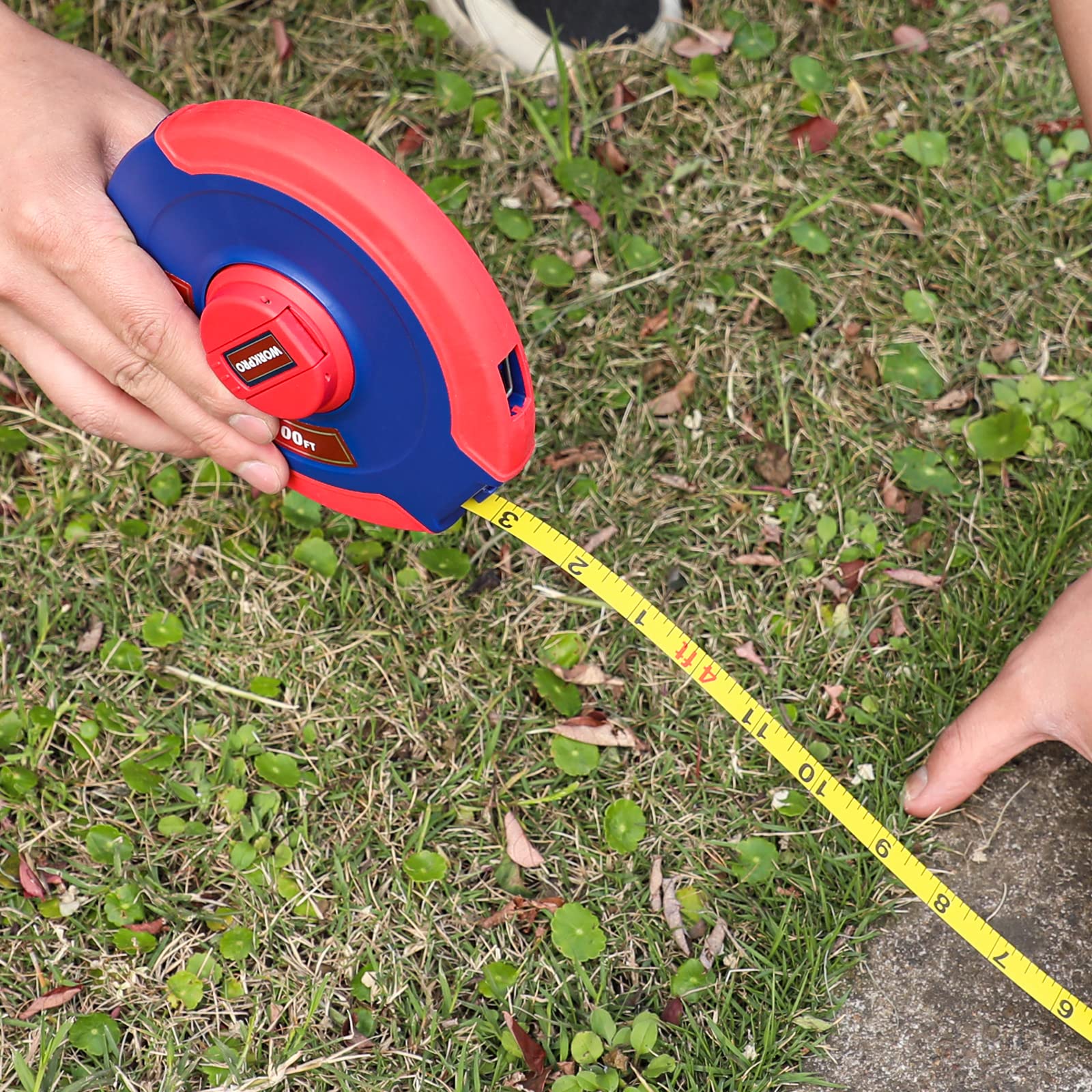 WORKPRO 100 FT Tape Measure, Closed Reel Steel Long Tape with Foldable Handle, Nylon Coated, Plastic and Rubber Case