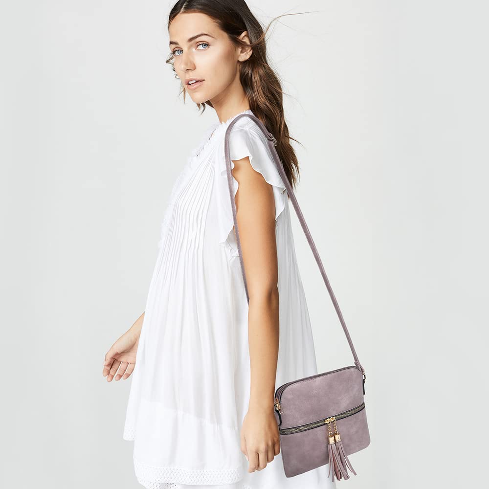 Style Strategy Lightweight Medium Dome Crossbody Bag for women with Tassel Zipper Pocket Adjustable Strap Shoulder Bag