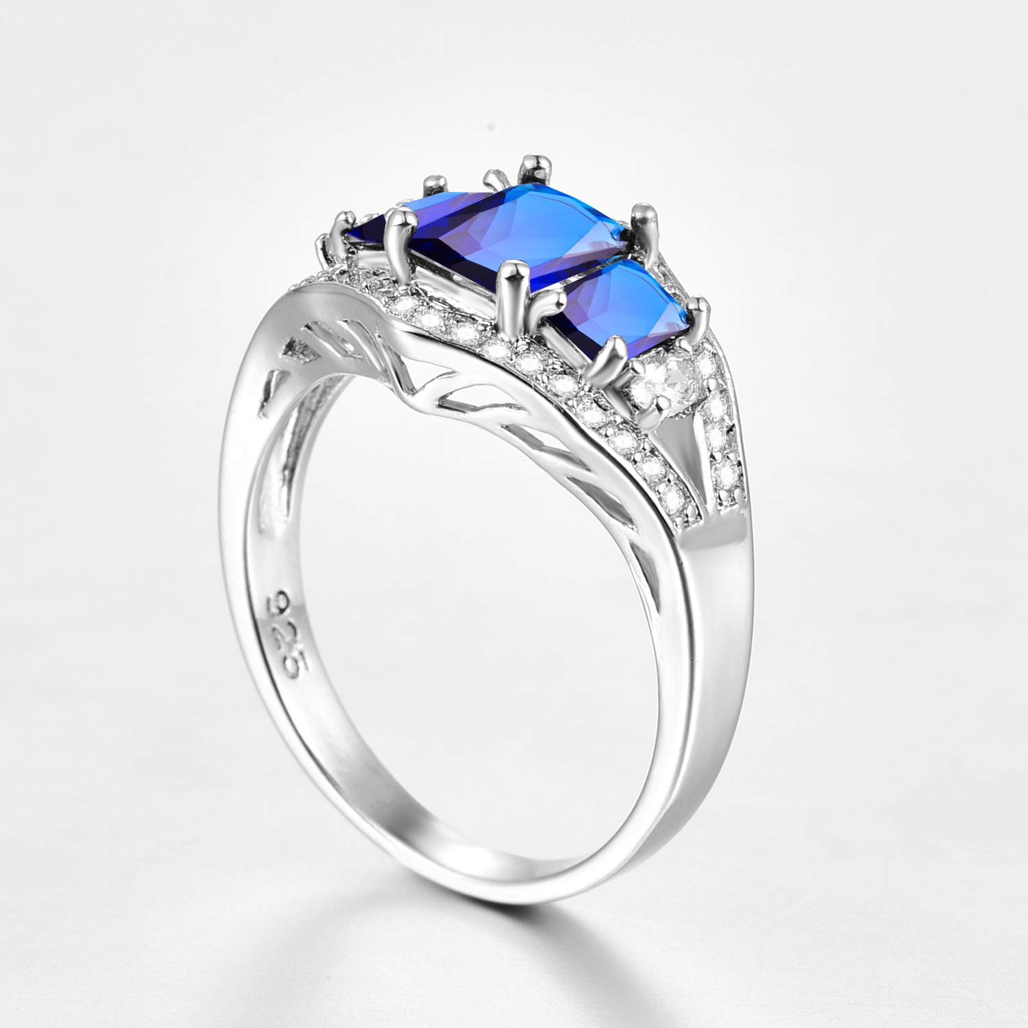 Narica Silver Plated 3-Stone Emerald Cut Created Blue Sapphire Cubic Zirconia Filled Halo Wedding Engagement Band Elegant Women's Ring for Mom Bridal Lover 7#