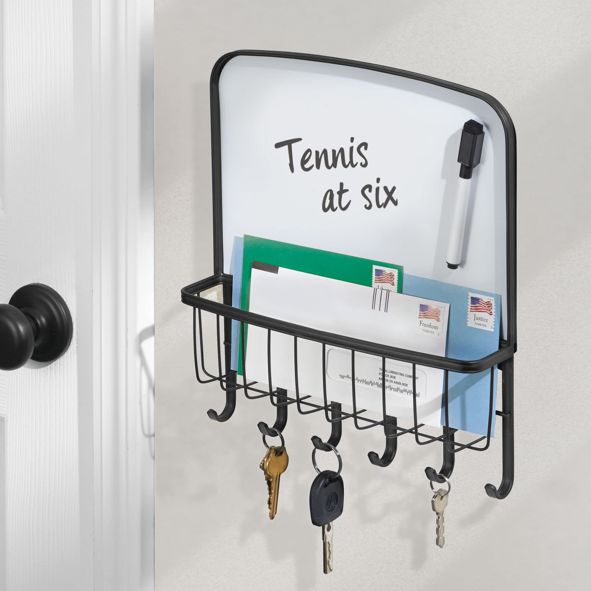 mDesign Metal Wall Mount Entryway Storage Organizer Mail Basket with Dry Erase Board, 6 Hooks - Holder for Letters, Magazines, Keys, Coats, Leashes - Strong Steel Wire Design - Matte Black