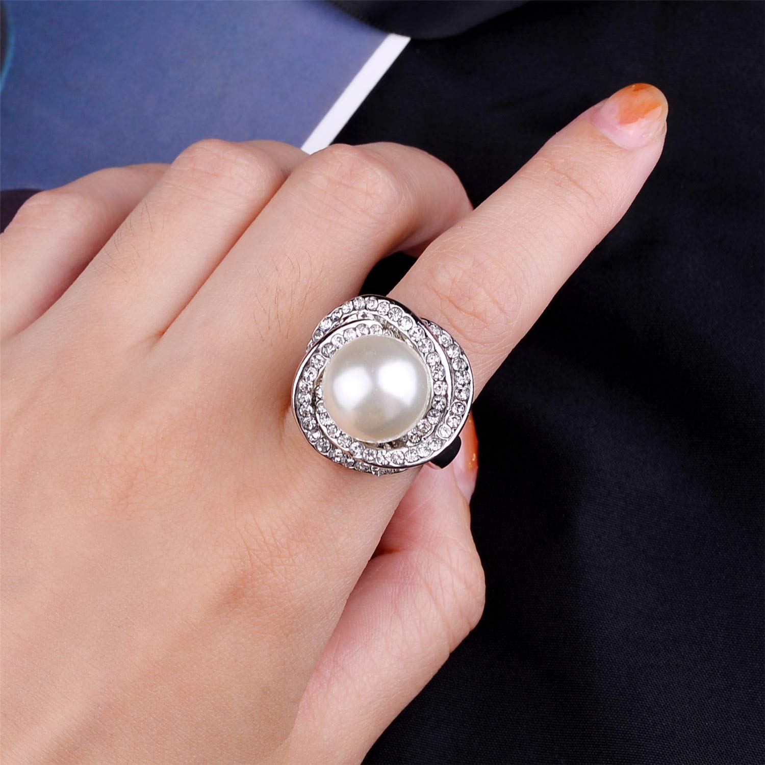 Nicole Miller New York Silvertone Adjustable Stretch Fashion Ring with Twisted Top White Pearl