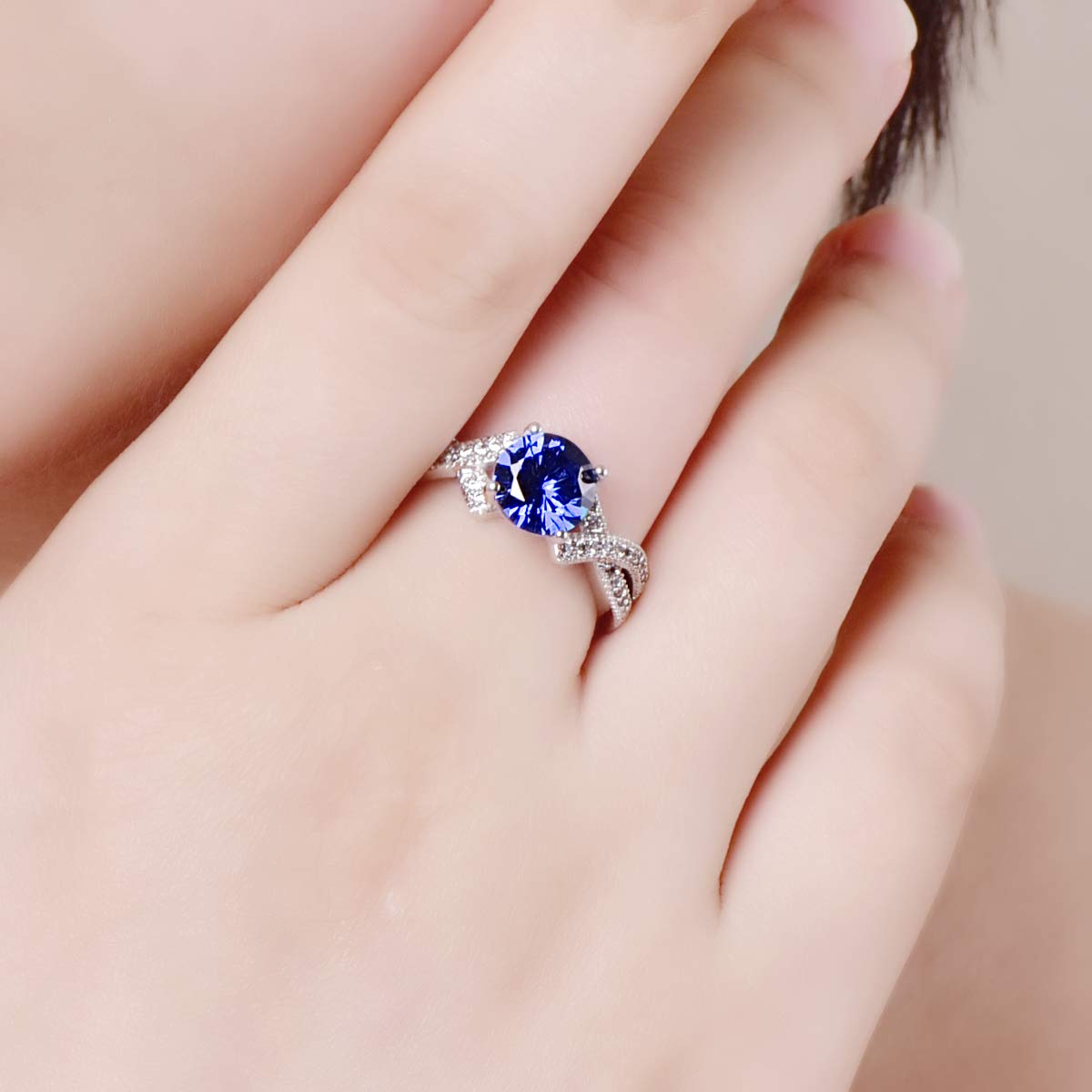 Momius 925 Sterling Silver 4-Prong Created Sapphire Quartz Brilliant Round Cut CZ Split Shank Twist Wedding Band Engagement Ring for Women Size 8