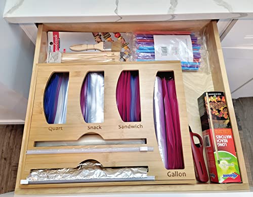 Redesigned and OVERSIZED ZipLock Bag storage organizer with plastic wrap and aluminum foil dispenser with cutter. 4 slots - Quart, Sandwich, Freezer and Gallon size.