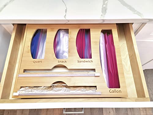 Redesigned and OVERSIZED ZipLock Bag storage organizer with plastic wrap and aluminum foil dispenser with cutter. 4 slots - Quart, Sandwich, Freezer and Gallon size.