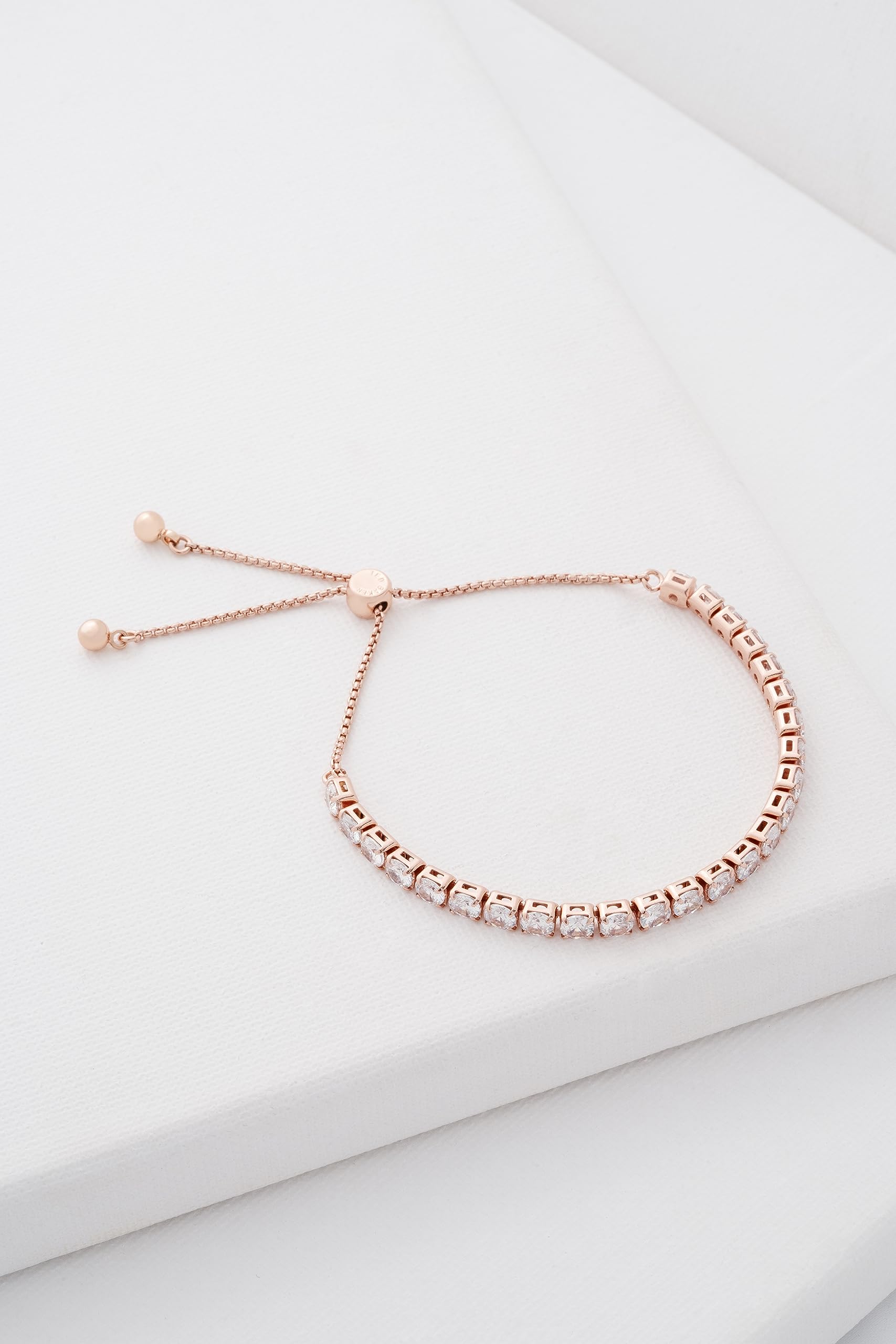 Ted Baker London Melrah Icon Crystal Slider Adjustable Tennis Bracelet for Women (Rose Gold Tone)