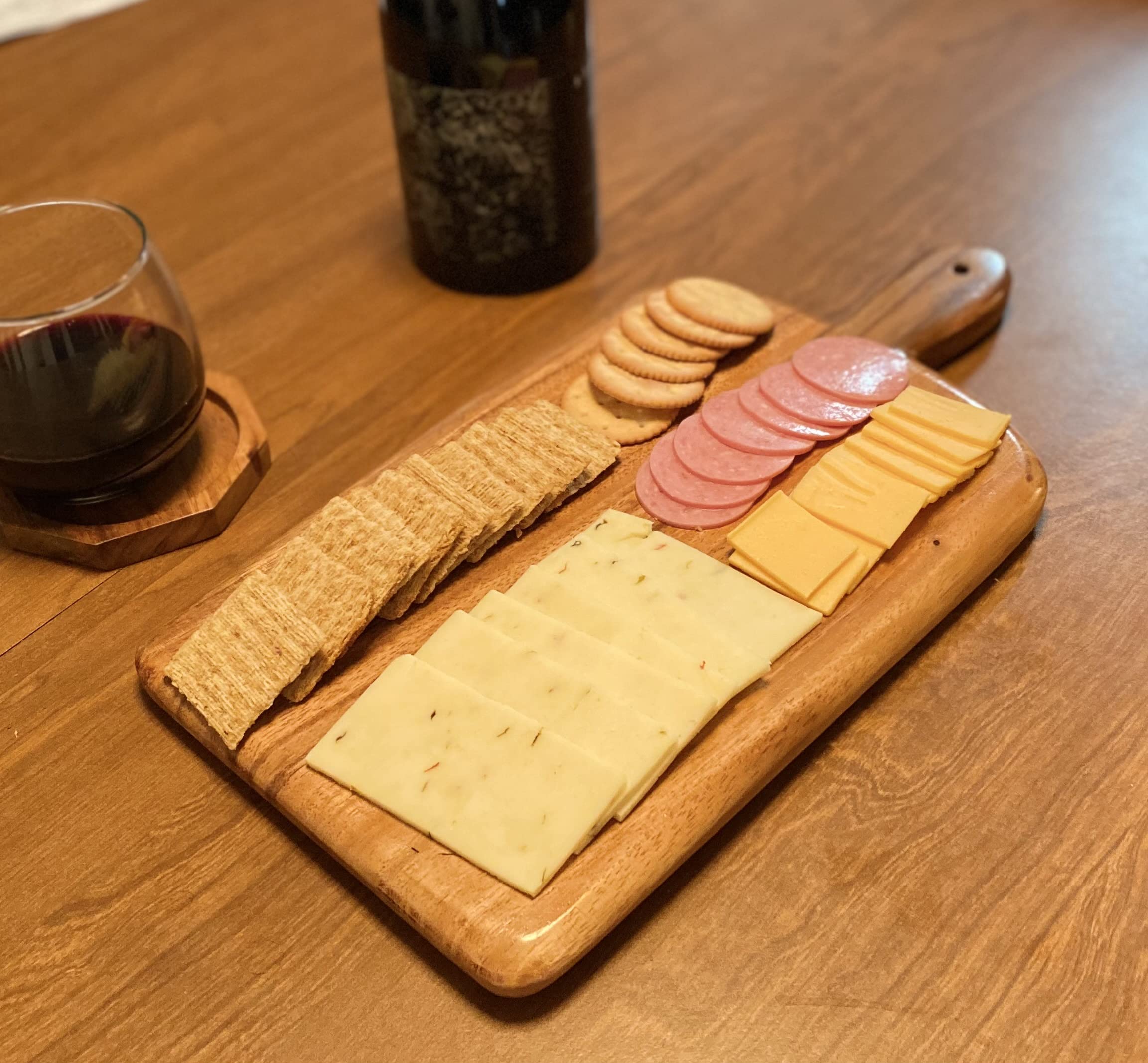 Wrightmart Wood Cutting Board for Kitchen, Server for Charcuterie, Bread, Cake, Fruit, Cheese, Vegetables and Appetizers, Acacia Hardwood, Reversible Paddle Design with Handle