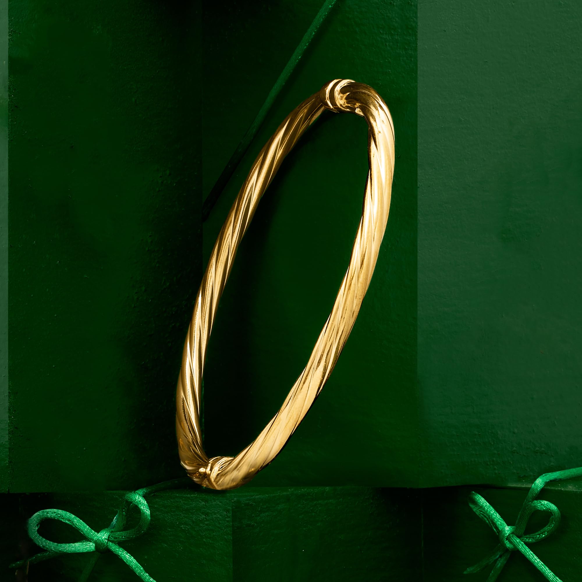 Ross-Simons Italian 4mm 18kt Gold Over Sterling Twisted Bangle Bracelet. 7 inches