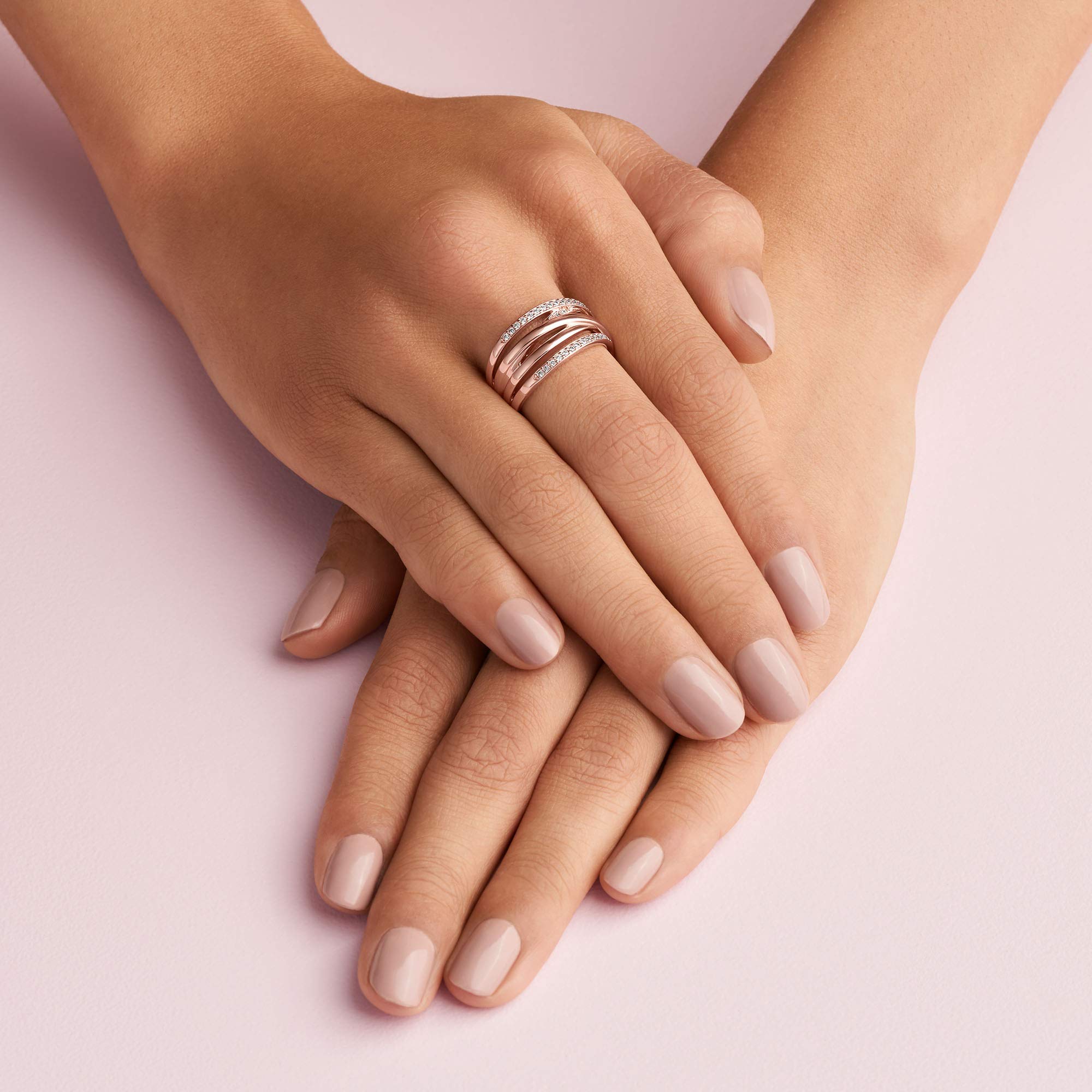 Pandora Sparkling & Polished Lines Entwined Ring - Rose Gold Ring for Women - Chic Cocktail Ring - Gift for Her - 14k Rose Gold-Plated Rose with Cubic Zirconia - Size 8.5