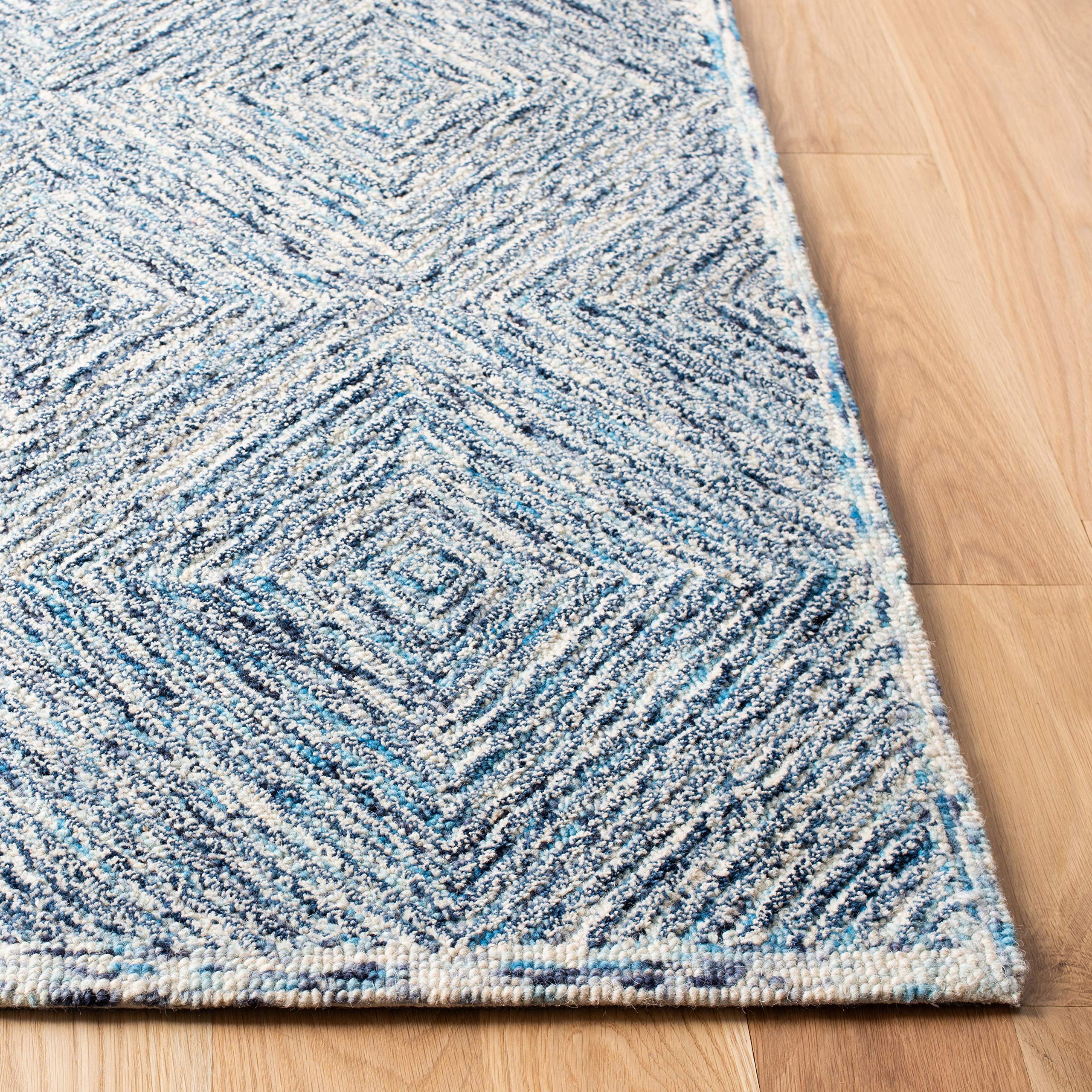 SAFAVIEH Capri Collection Area Rug - 9' x 12', Ivory & Blue, Handmade Wool, Ideal for High Traffic Areas in Living Room, Bedroom (CPR207A)
