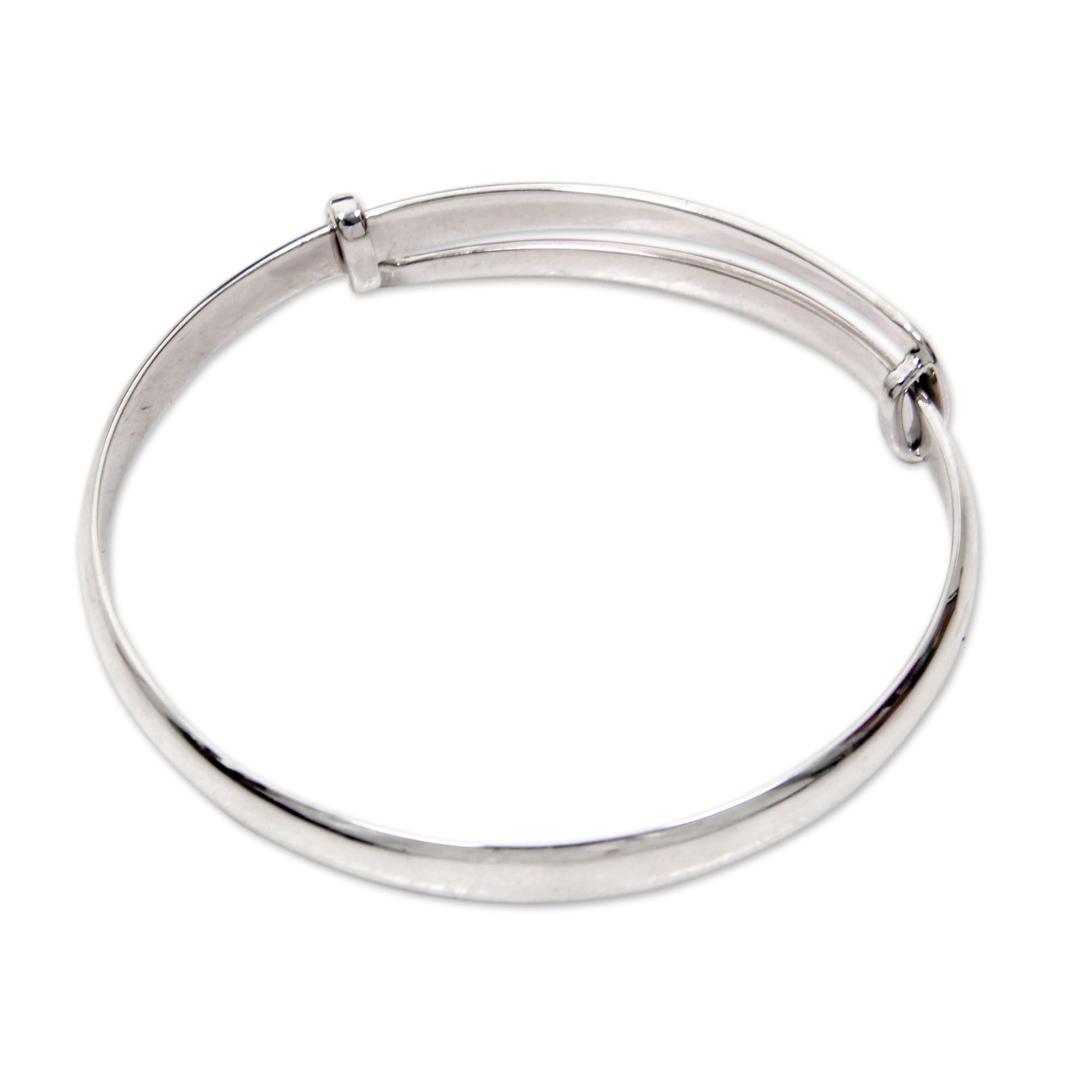 NOVICA Artisan Handcrafted Sterling Silver Bangle Bracelet Balinese Indonesia Modern [7 in Inner Circ. x 0.4 in W] ' Tender Embrace'
