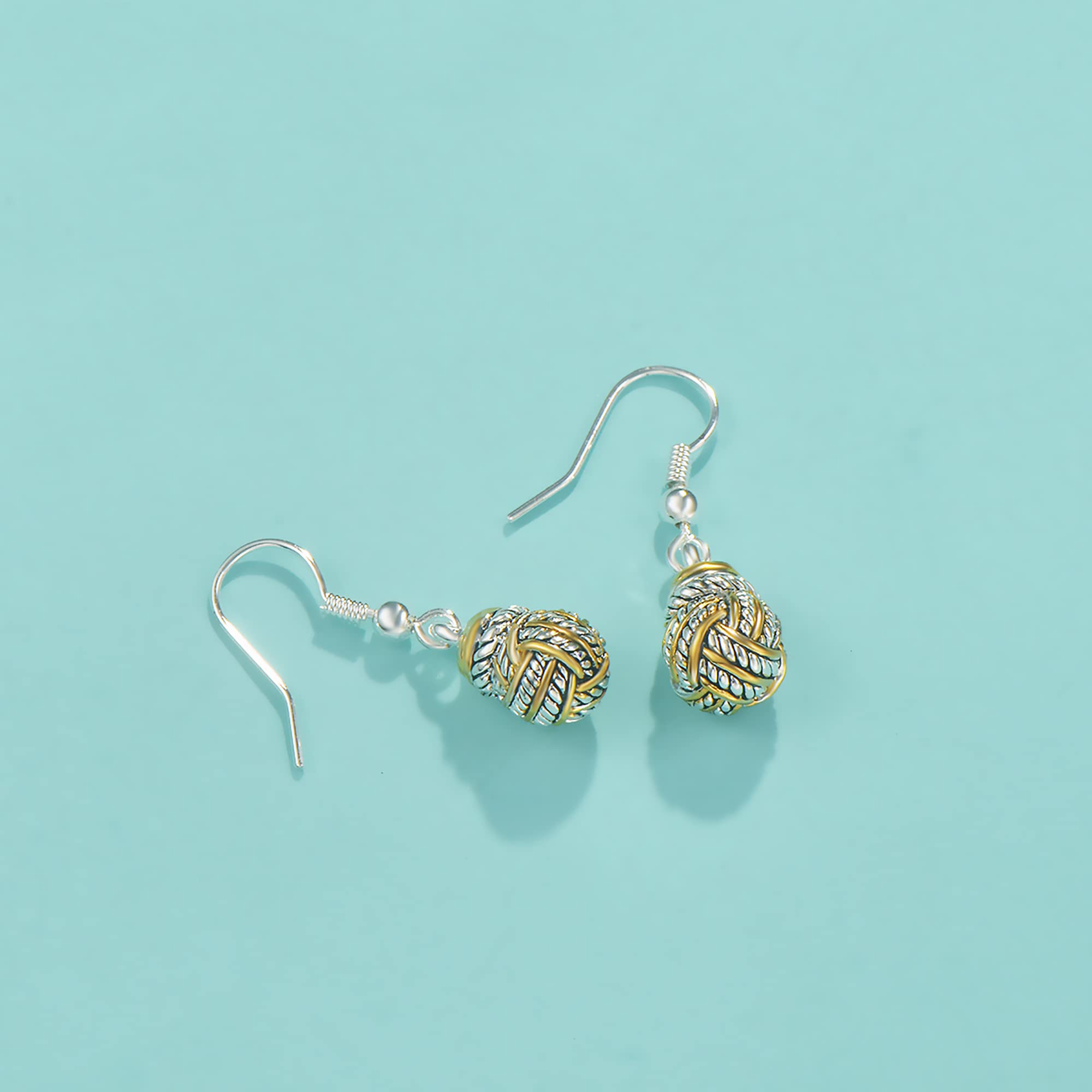 UNY Jewel Jewelry Make a Statement With Our Two Tone Twisted Cable Wire Dangle Ball Fish Hook Earrings Featuring Detailing Perfect For Any Occasion