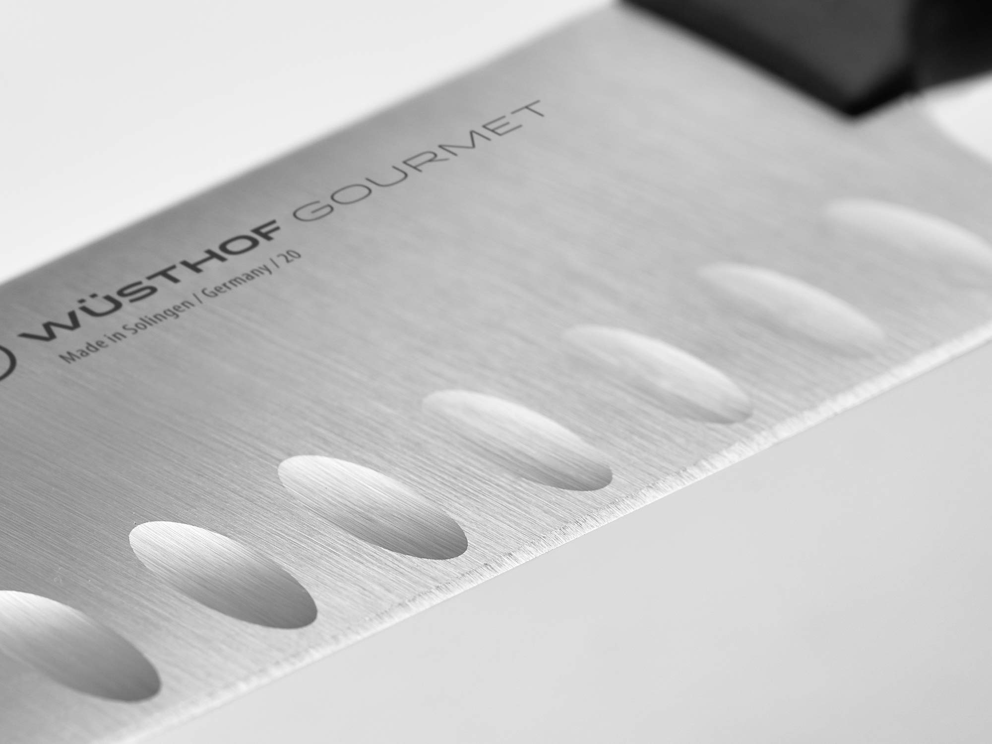 WÜSTHOF Gourmet 2-Piece Chef's Knife Set & Gourmet 7" Hollow Edge Santoku Knife